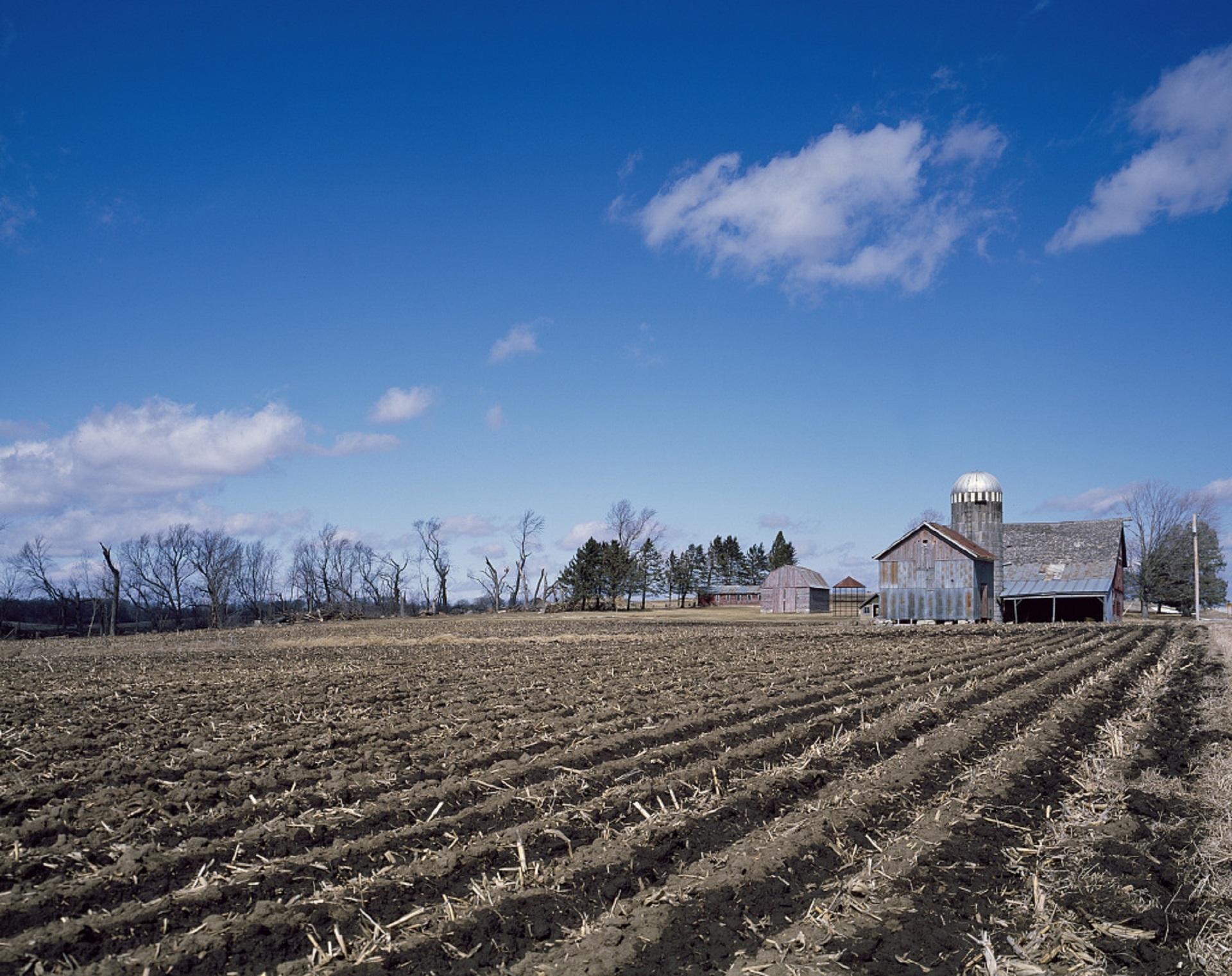 Plowed field on corn planting farm at winter free image download