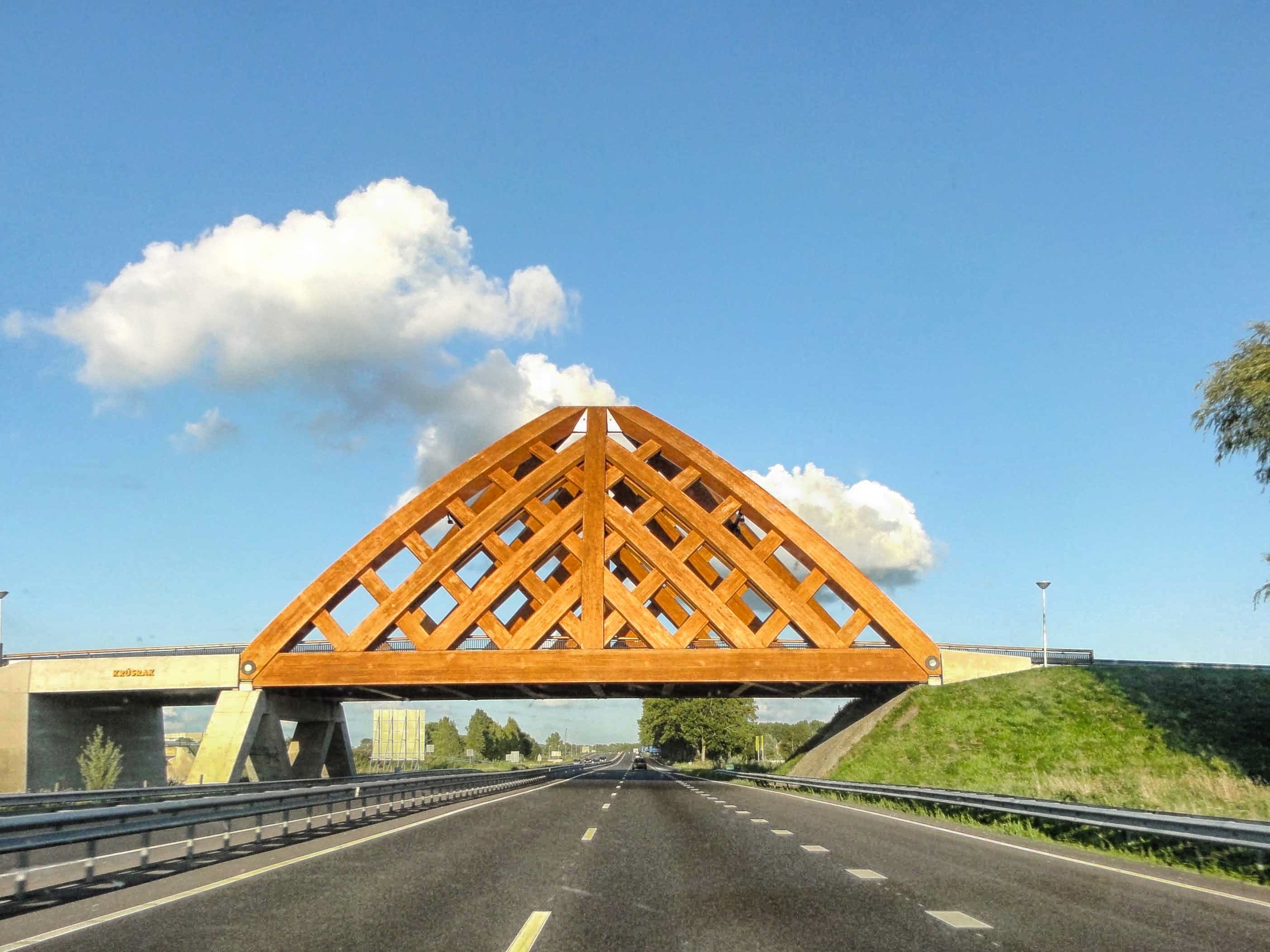 Wooden pyramid construction on krusrak bridge across highway ...