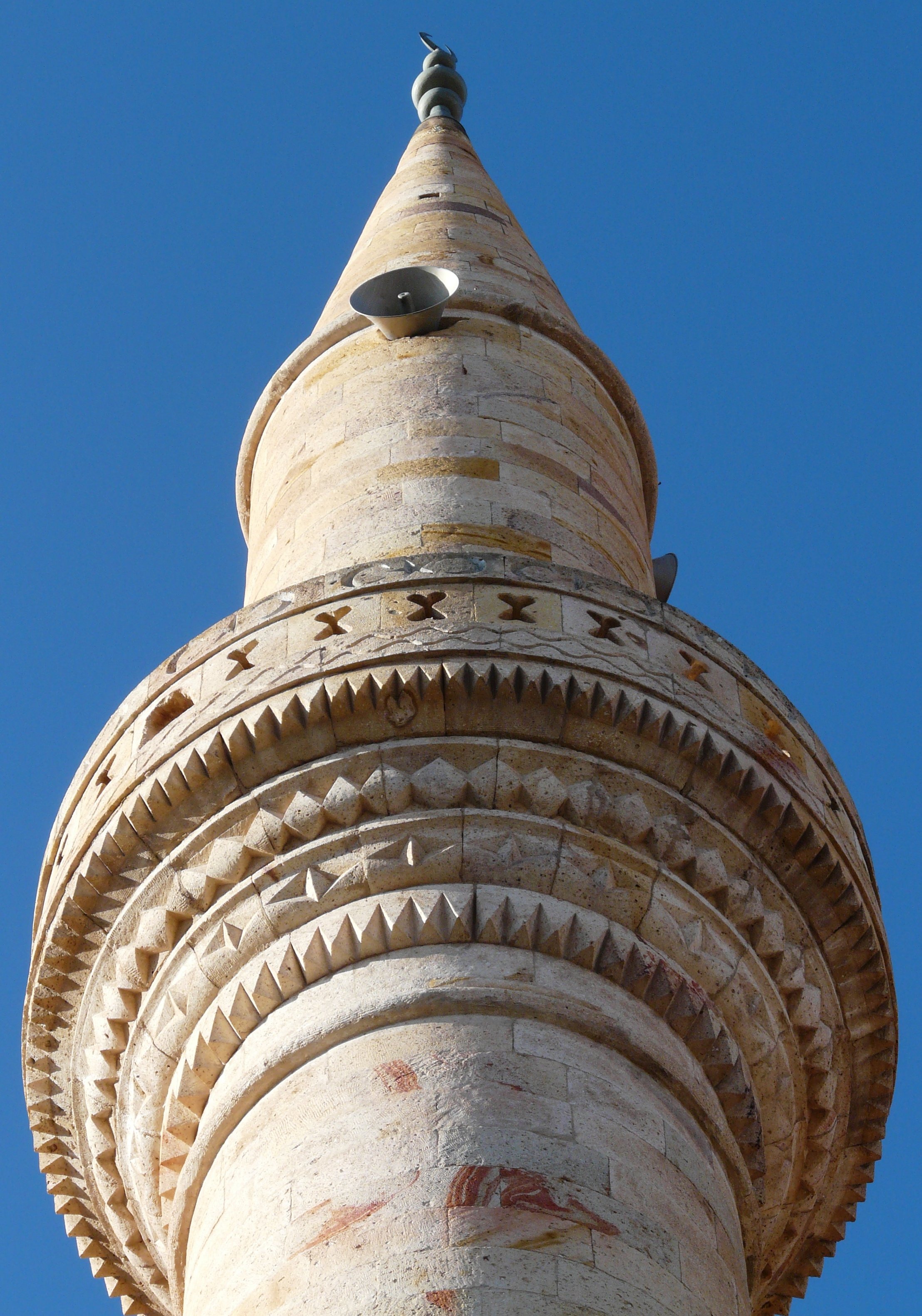 Minaret of mosque in Turkey against the blue sky free image download