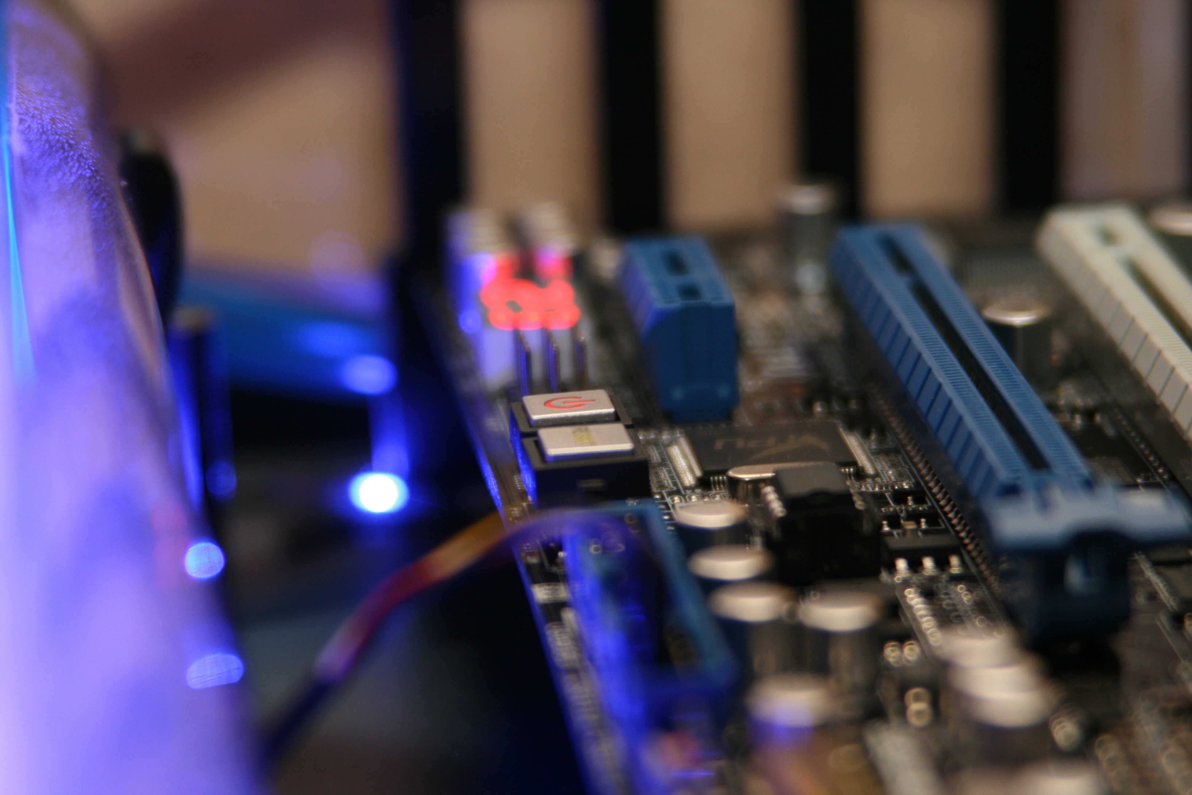 Blue backlit computer motherboard free image download