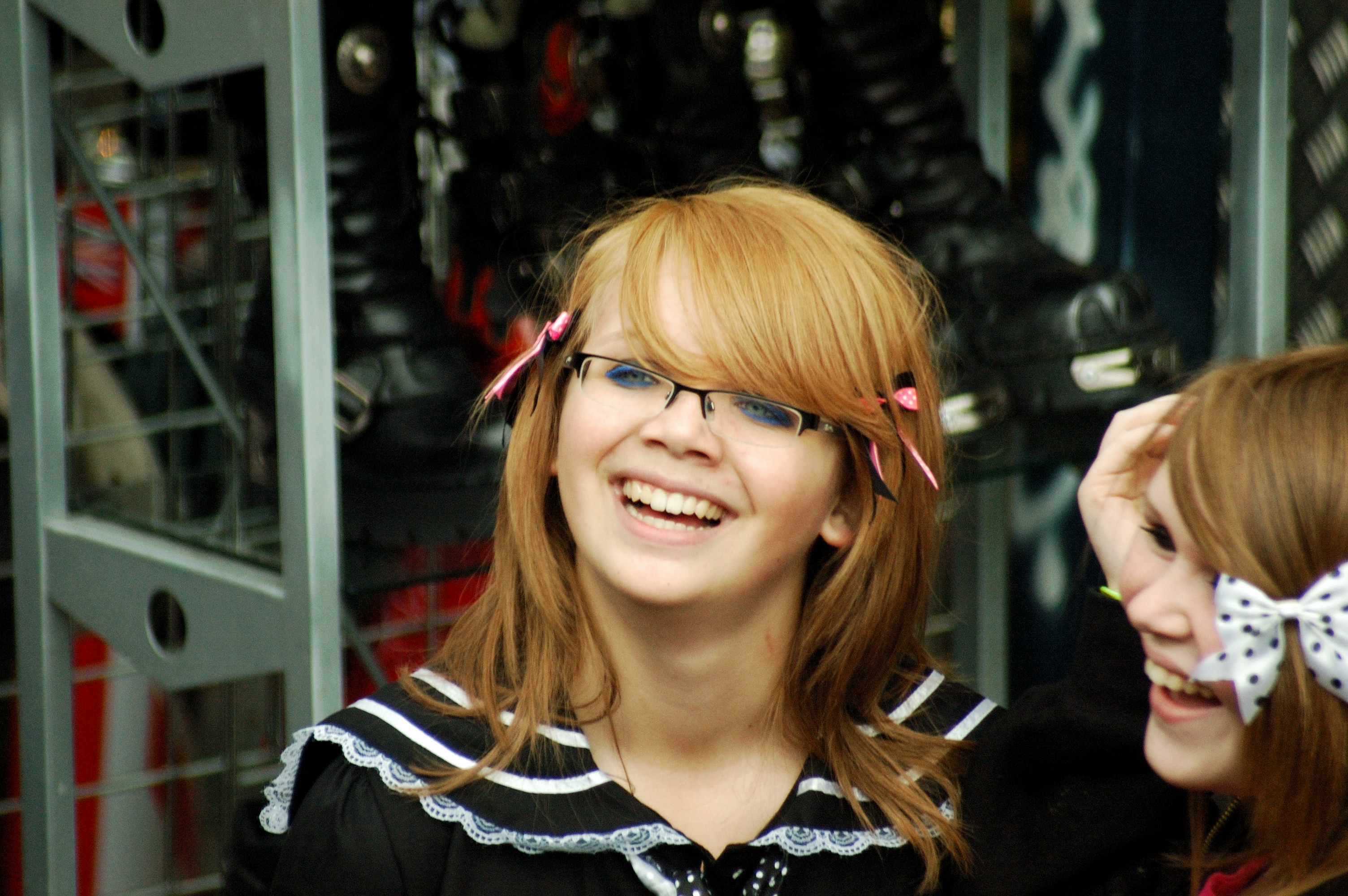 Portrait of two laughing girls with bows on their heads free image download