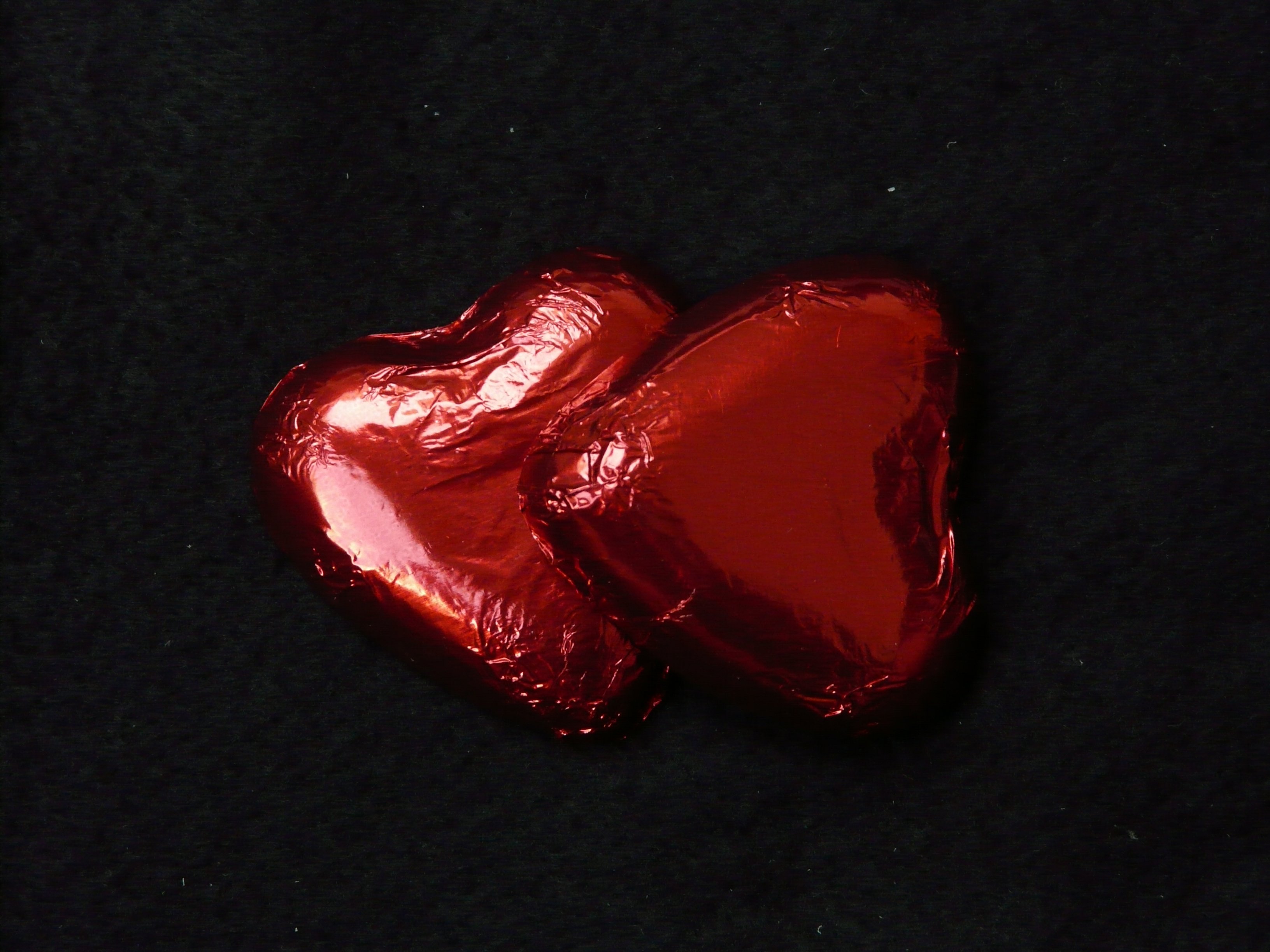 Two hearts in a red package free image download