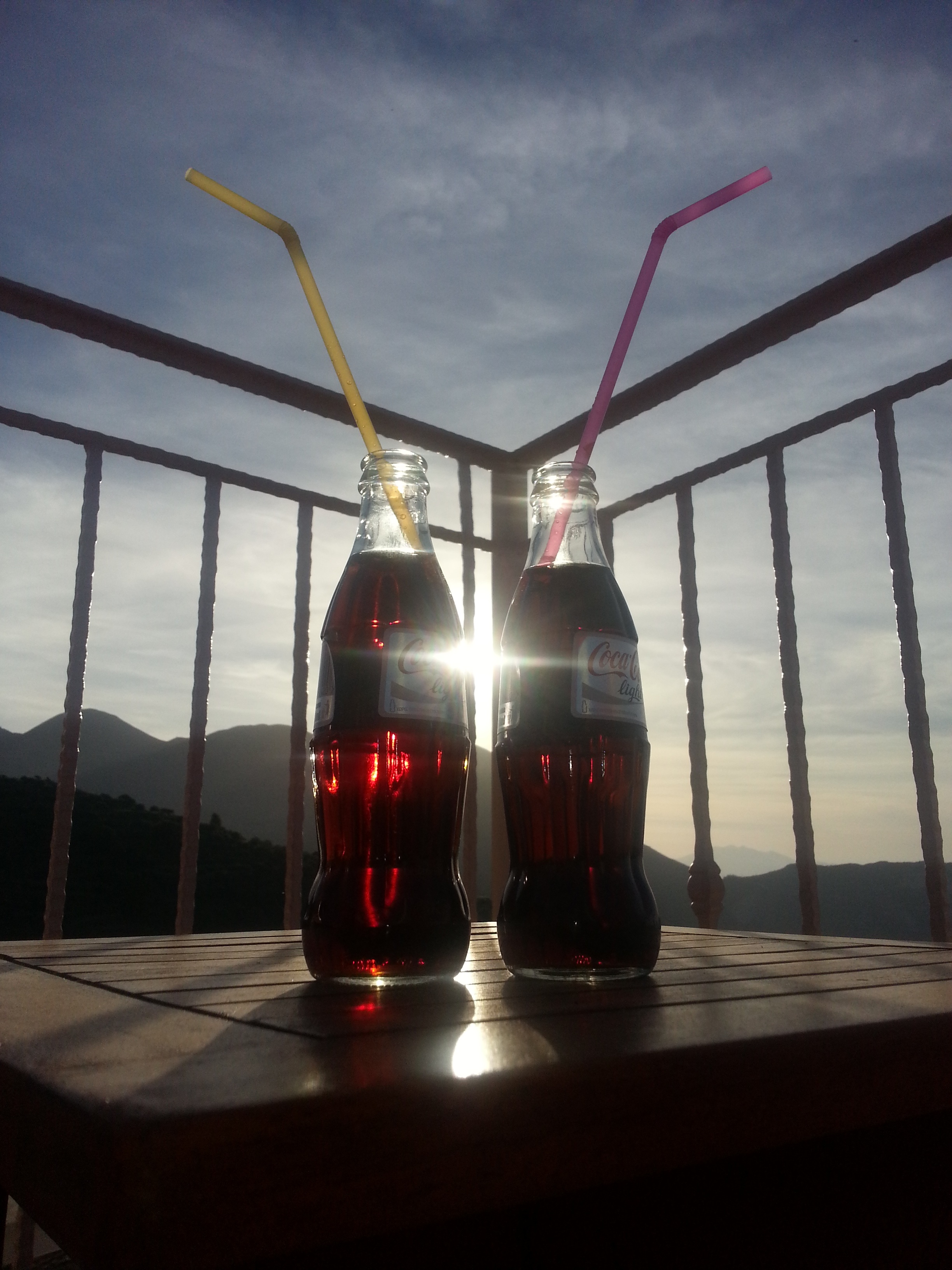 Coca cola bottles at the sunlight free image download