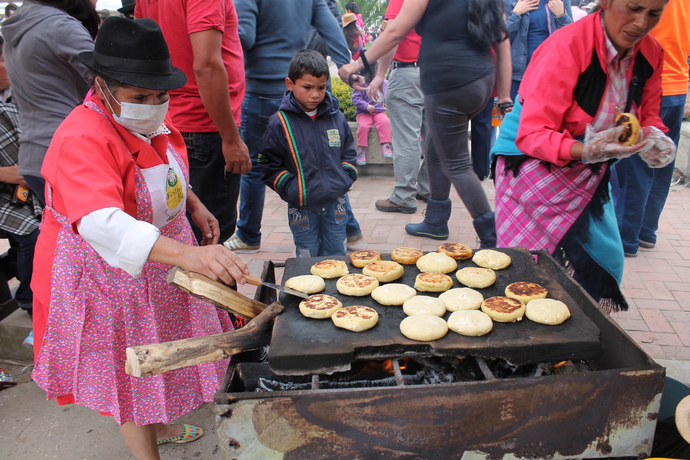 Woman Grilling buns outdoor, columbia free image download