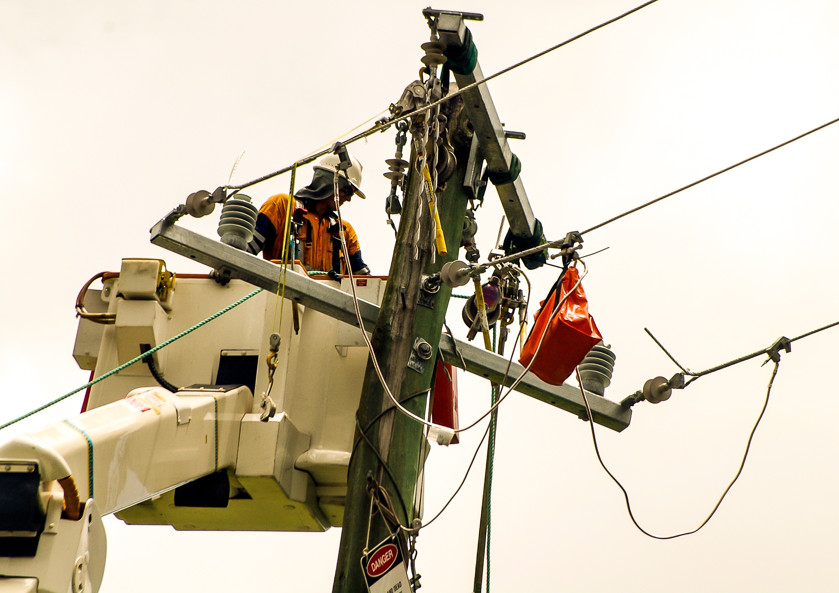 Master repairing high-voltage wires free image download