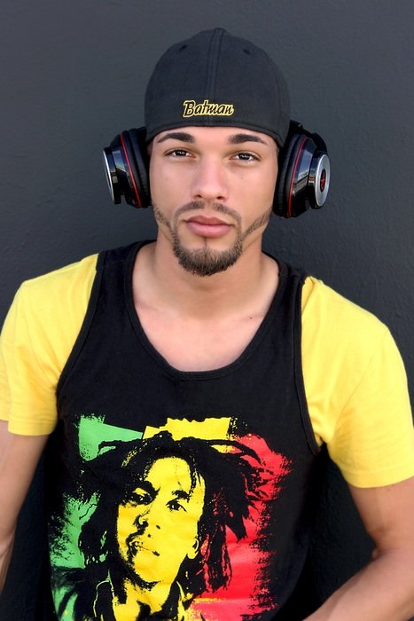 Young cute hip hop musician in headphones free image download
