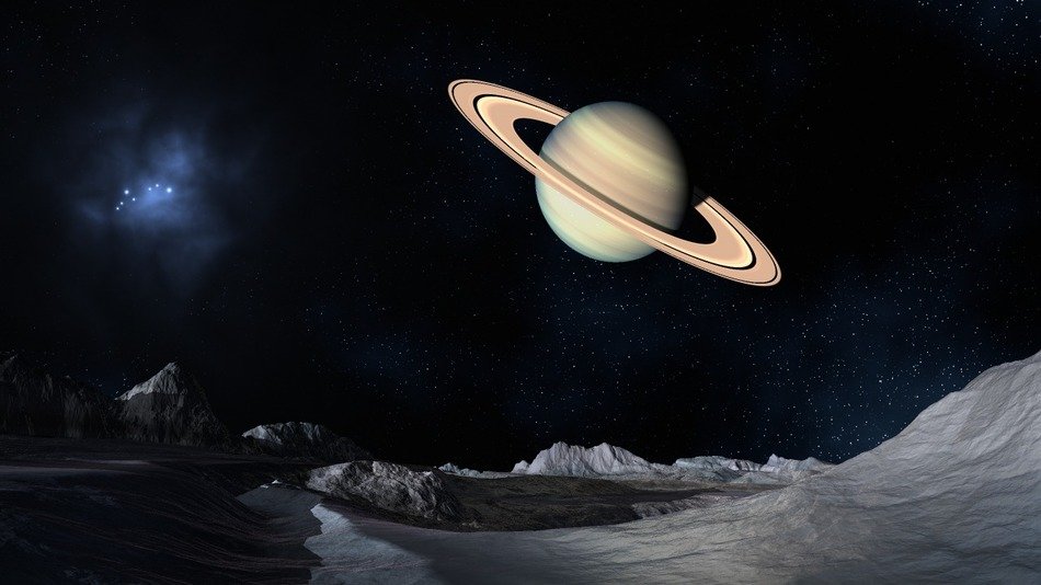 Yellow Saturn in black space above the landscape free image download
