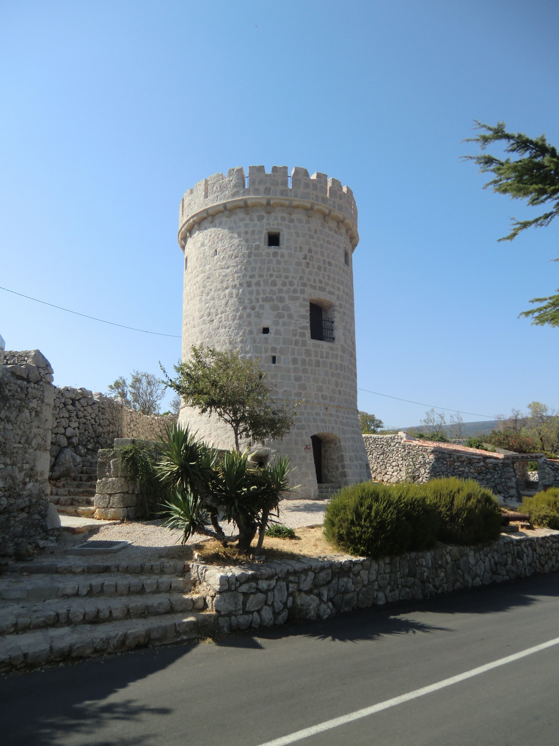 Medieval white tower in Cres, Croatia free image download