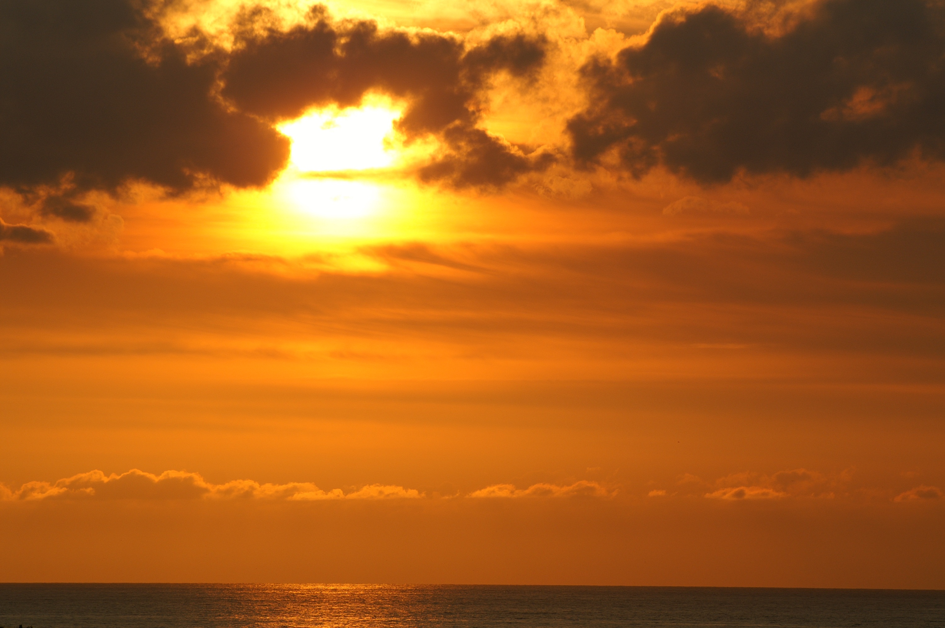 Orange sunset over the Normandy coast free image download