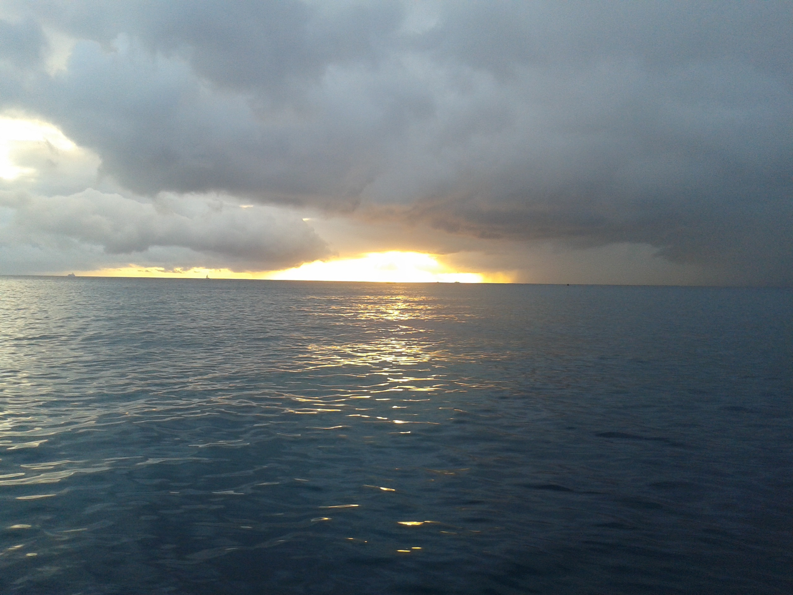 Tropical sunset over the ocean free image download