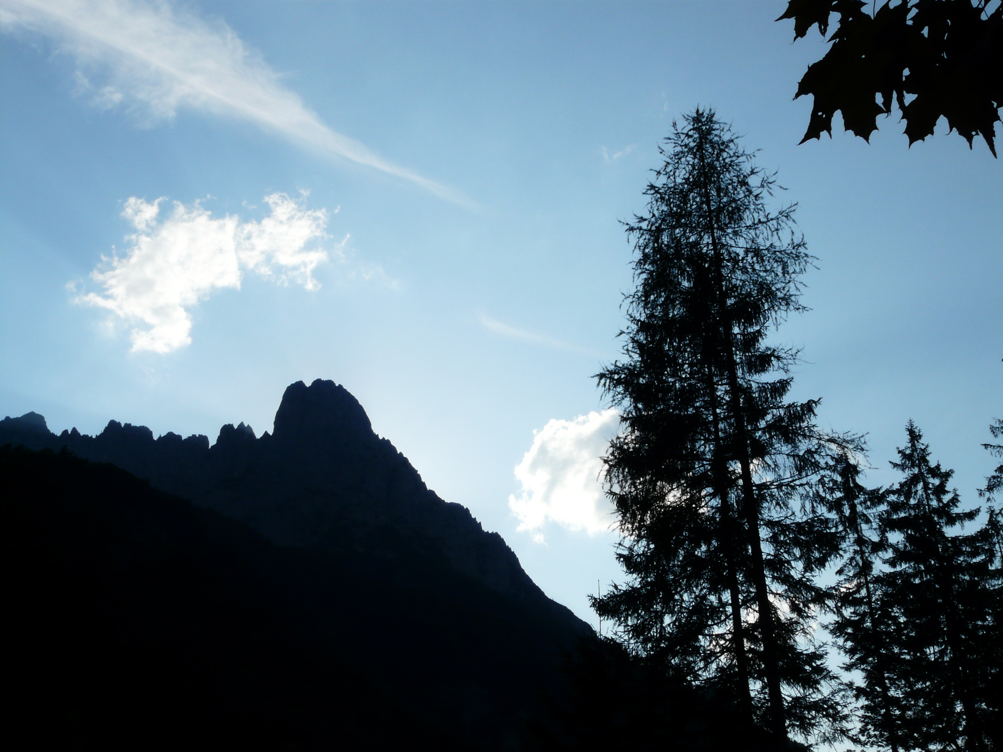 Sunlight behind the mountains free image download