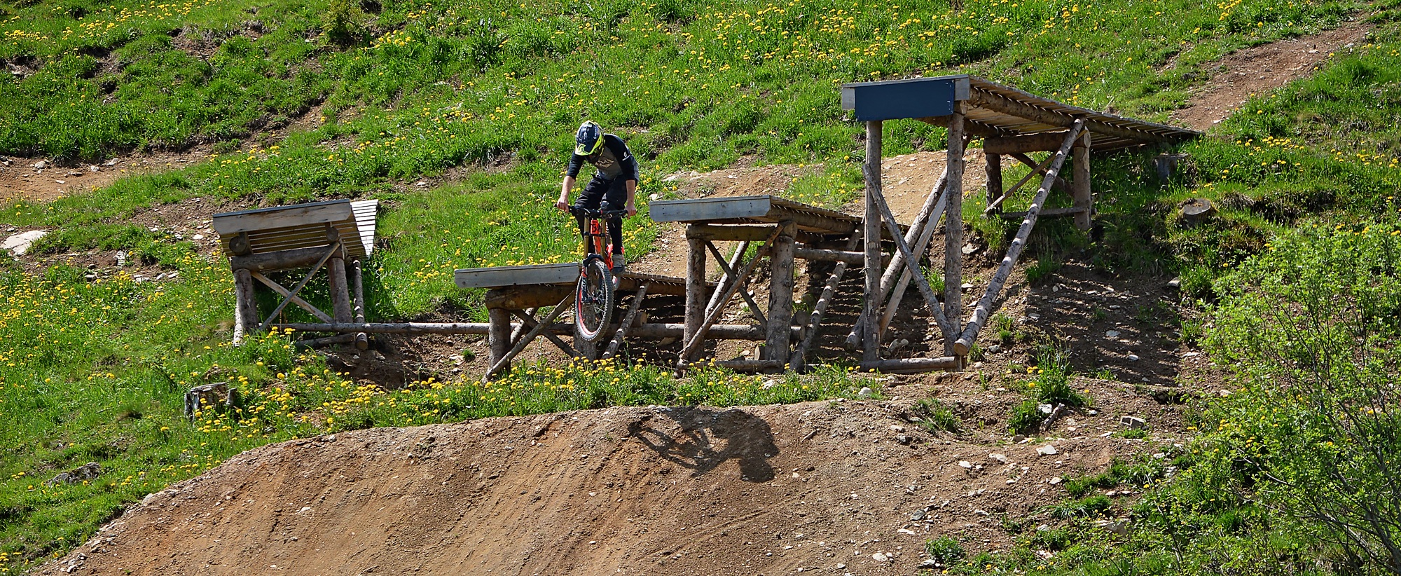 Biker man jumping over the hill on a bicycle free image download