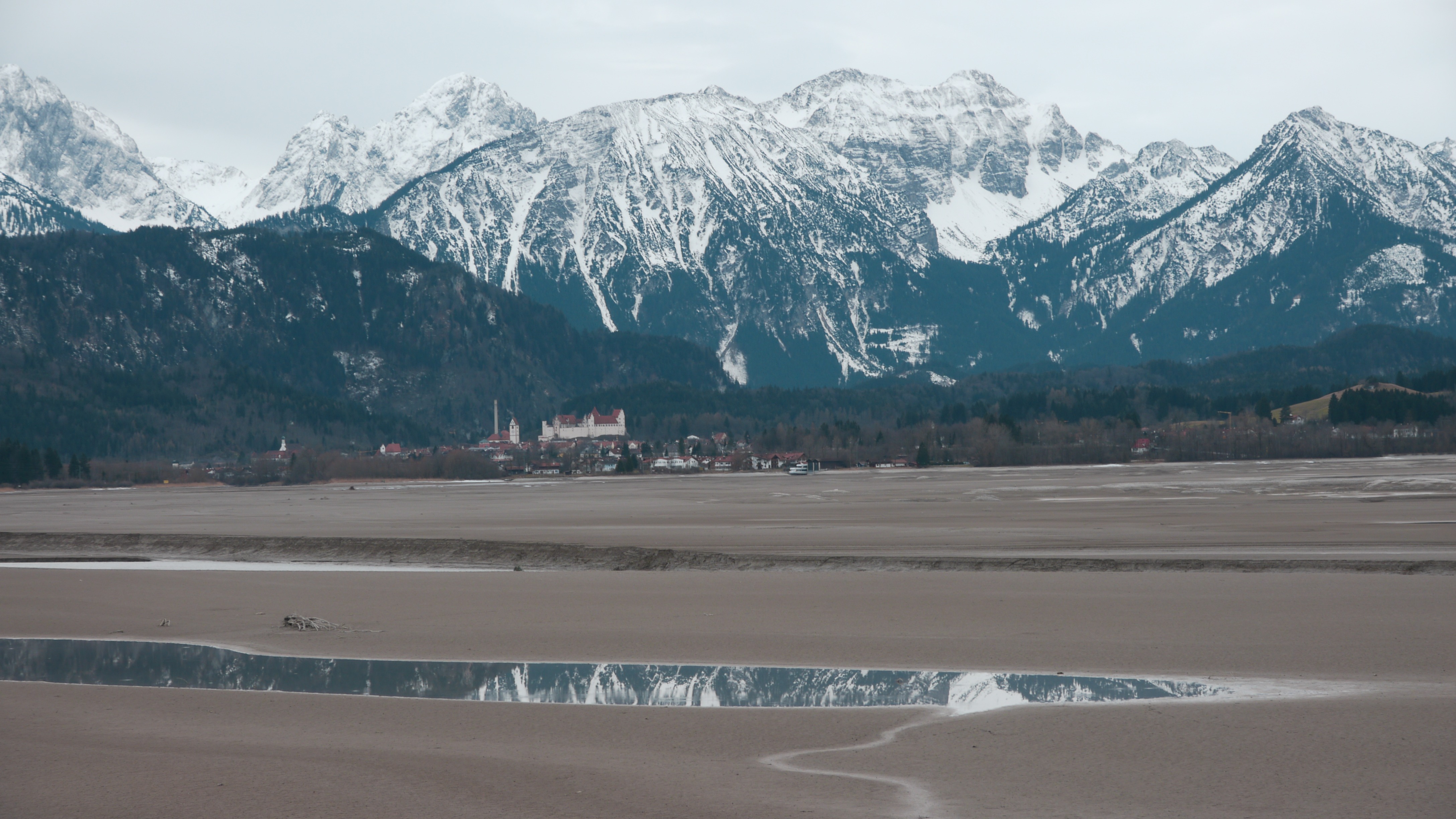Lake forggensee at mountains, allgäu alps at winter free image download