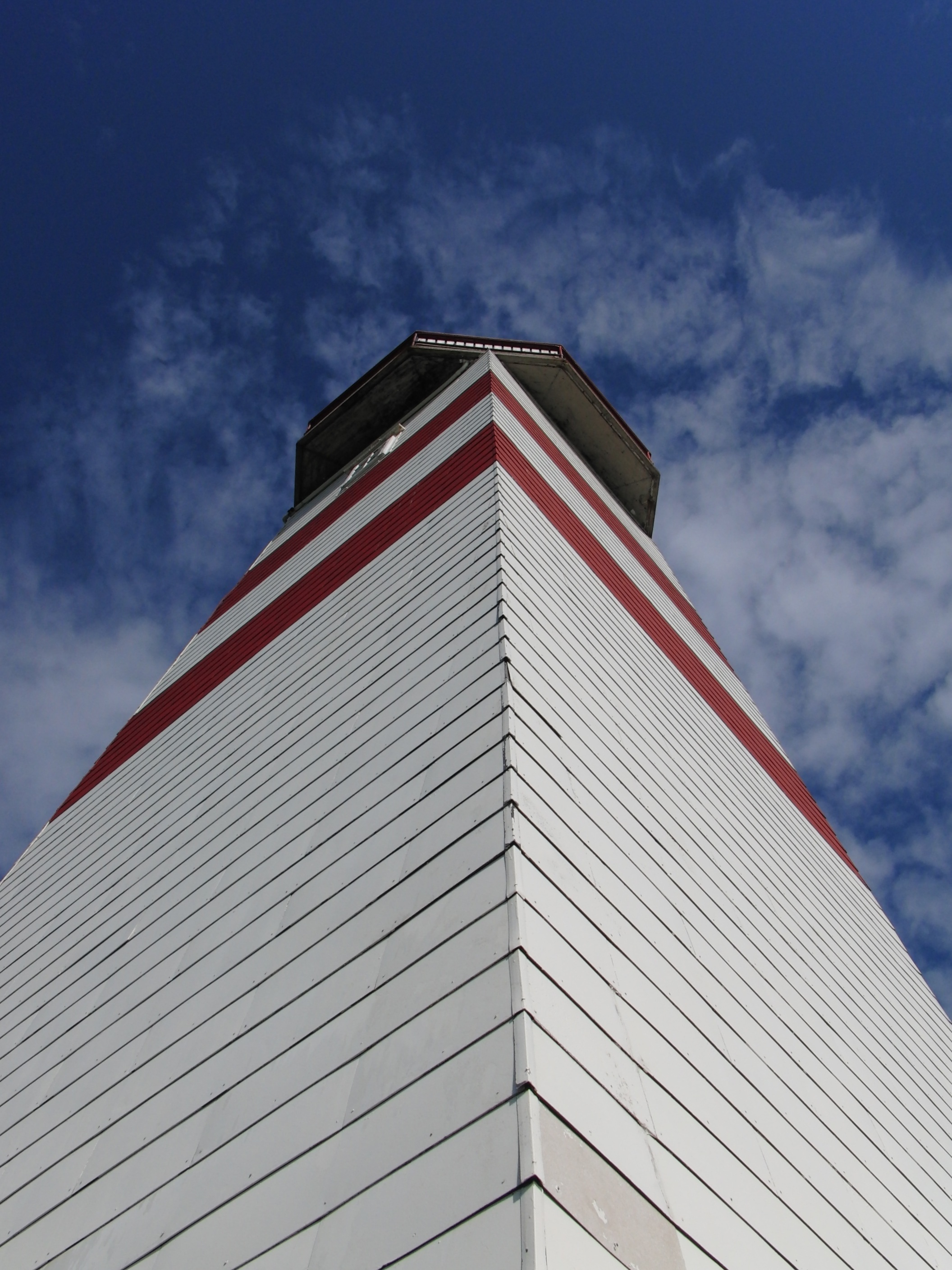 Lighthouse in blue sky, bottom view free image download