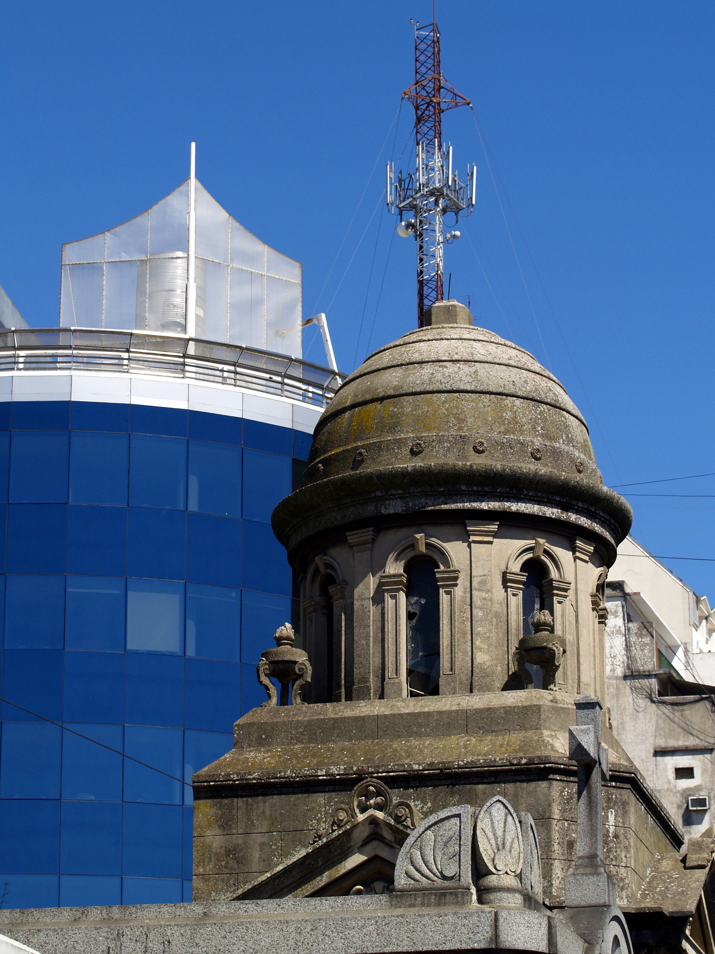 Old tower on the background of a modern building in Buenos Ares free ...