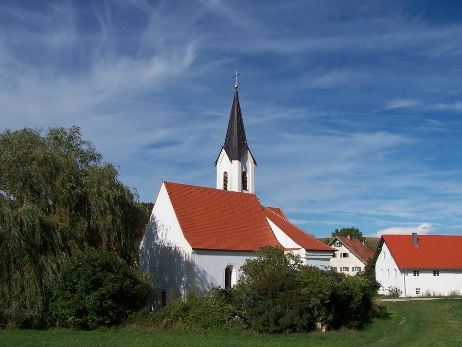 Sharp-pointed church in rural Germany free image download