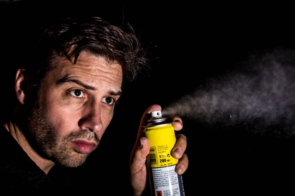 Man Holding A Spray Can Free Image Download