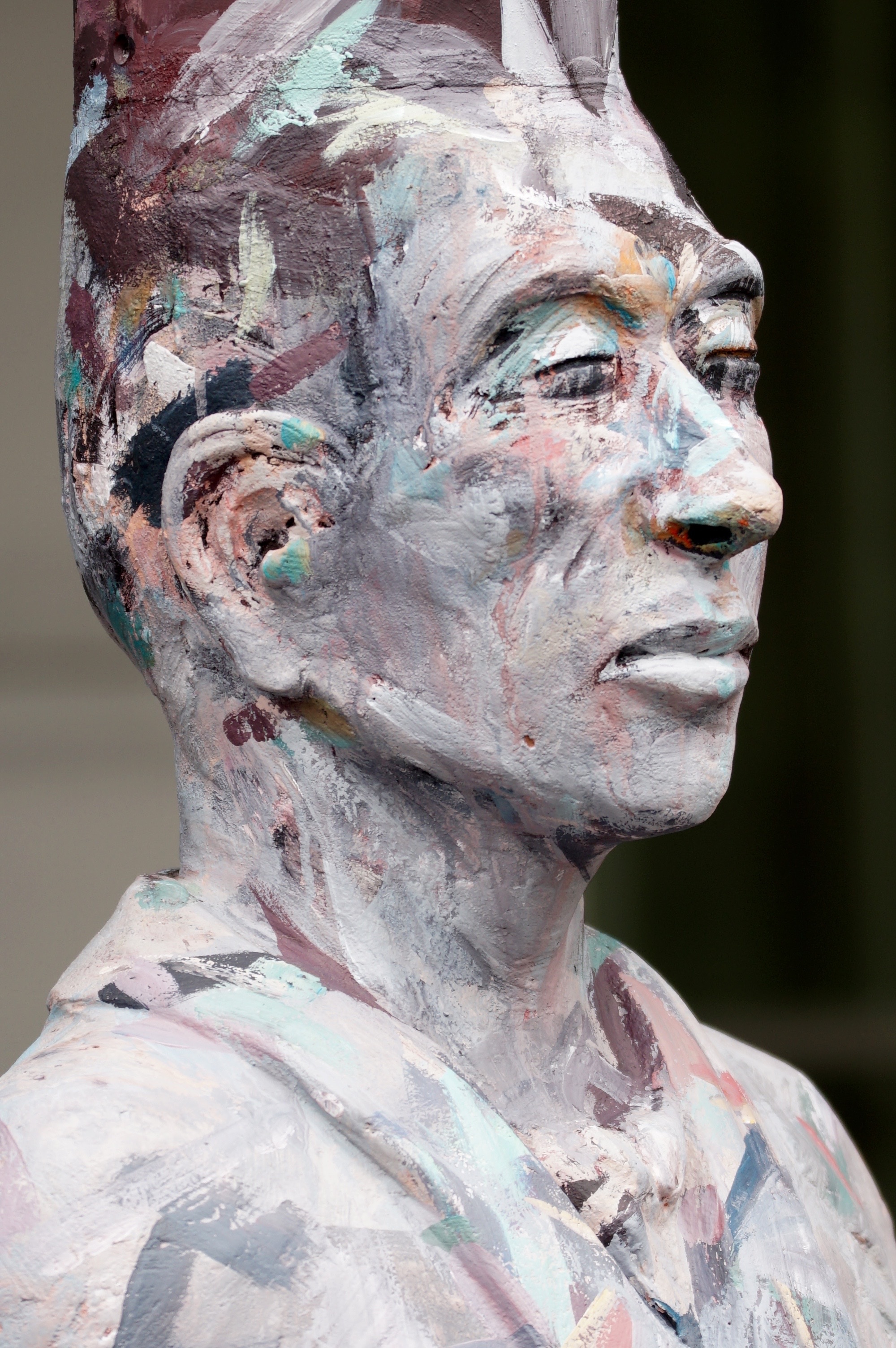 Colorful bust of a man near the wall free image download