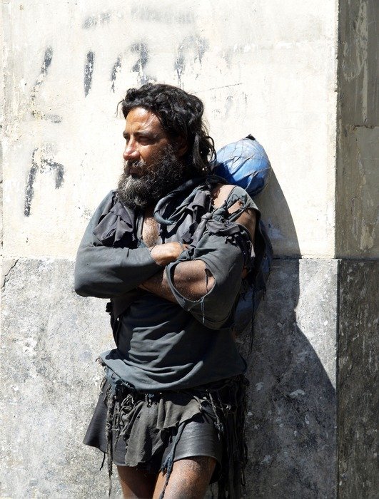 Man tramp near the wall free image download