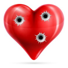 Metallic heart with bullet holes free image download