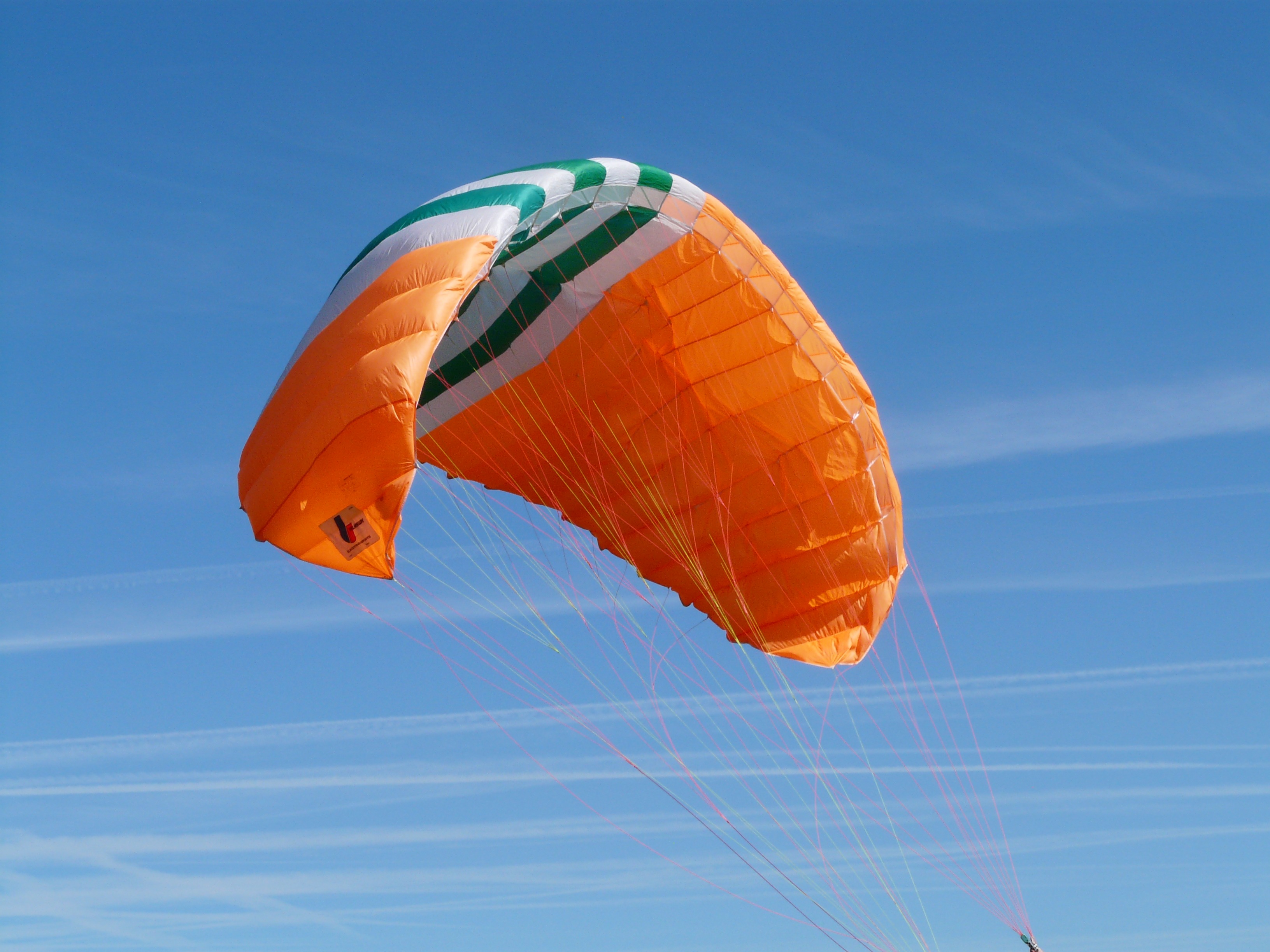Orange parachute in clear blue sky free image download