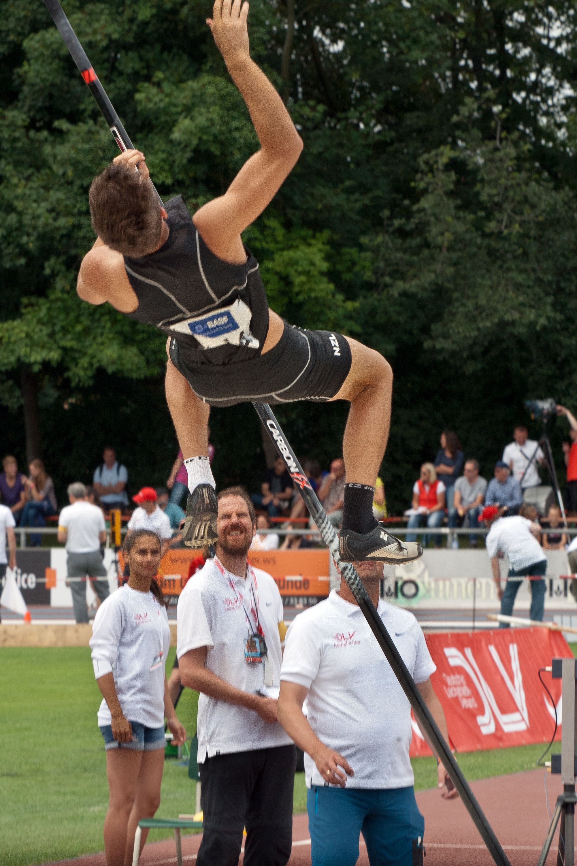 Athlete with a pole in the process of falling free image download