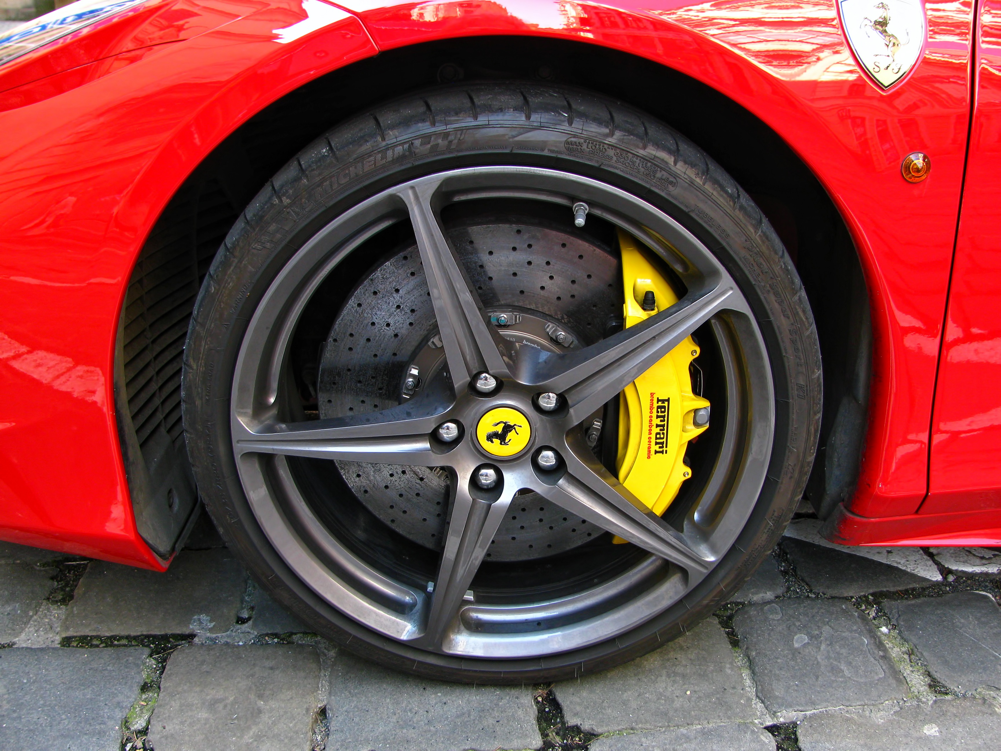 Wheel of red ferrari free image download