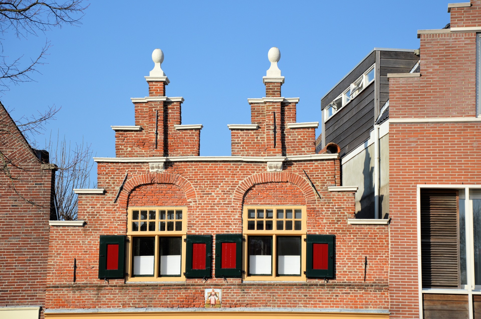 Traditional dutch building facade made of bricks free image download