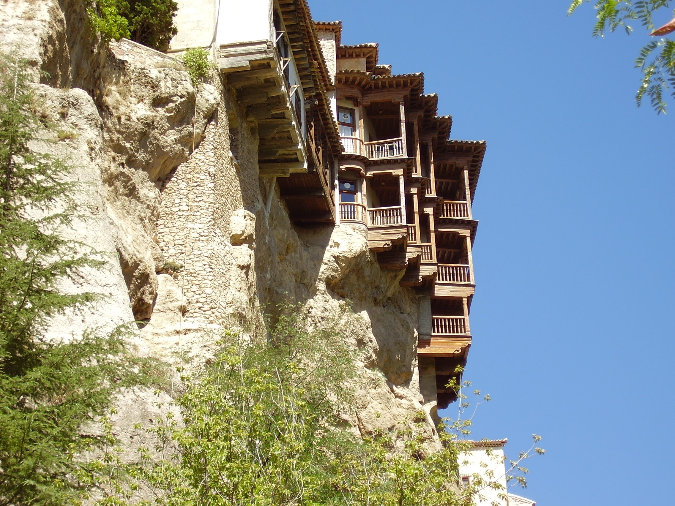 Hanging houses on a cliff free image download