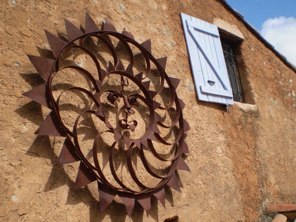 Sundial on building facade free image download