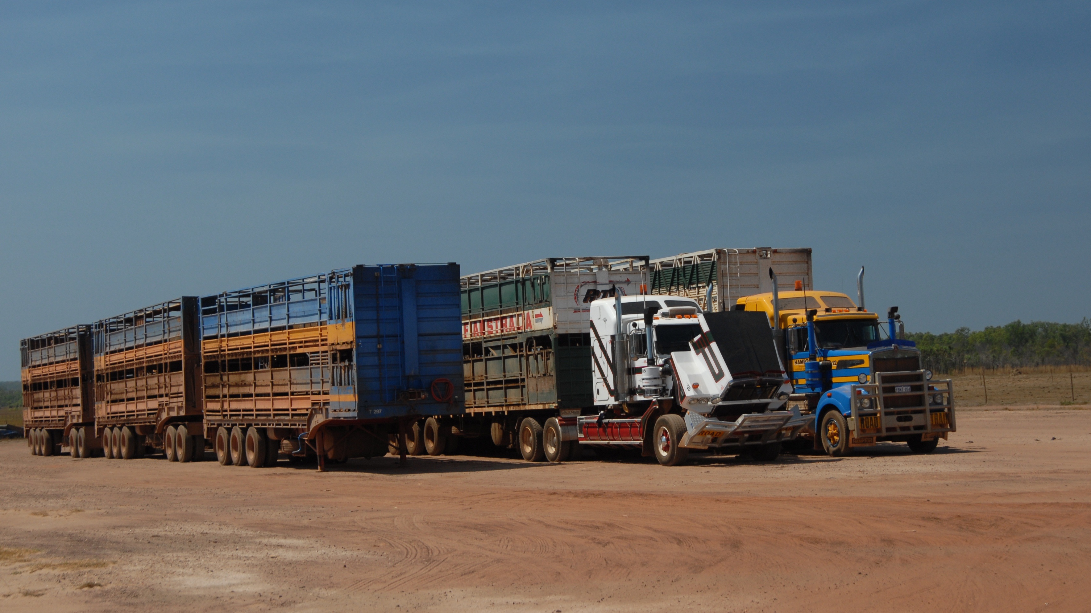 Trucks with trailers in the desert in Australia free image download