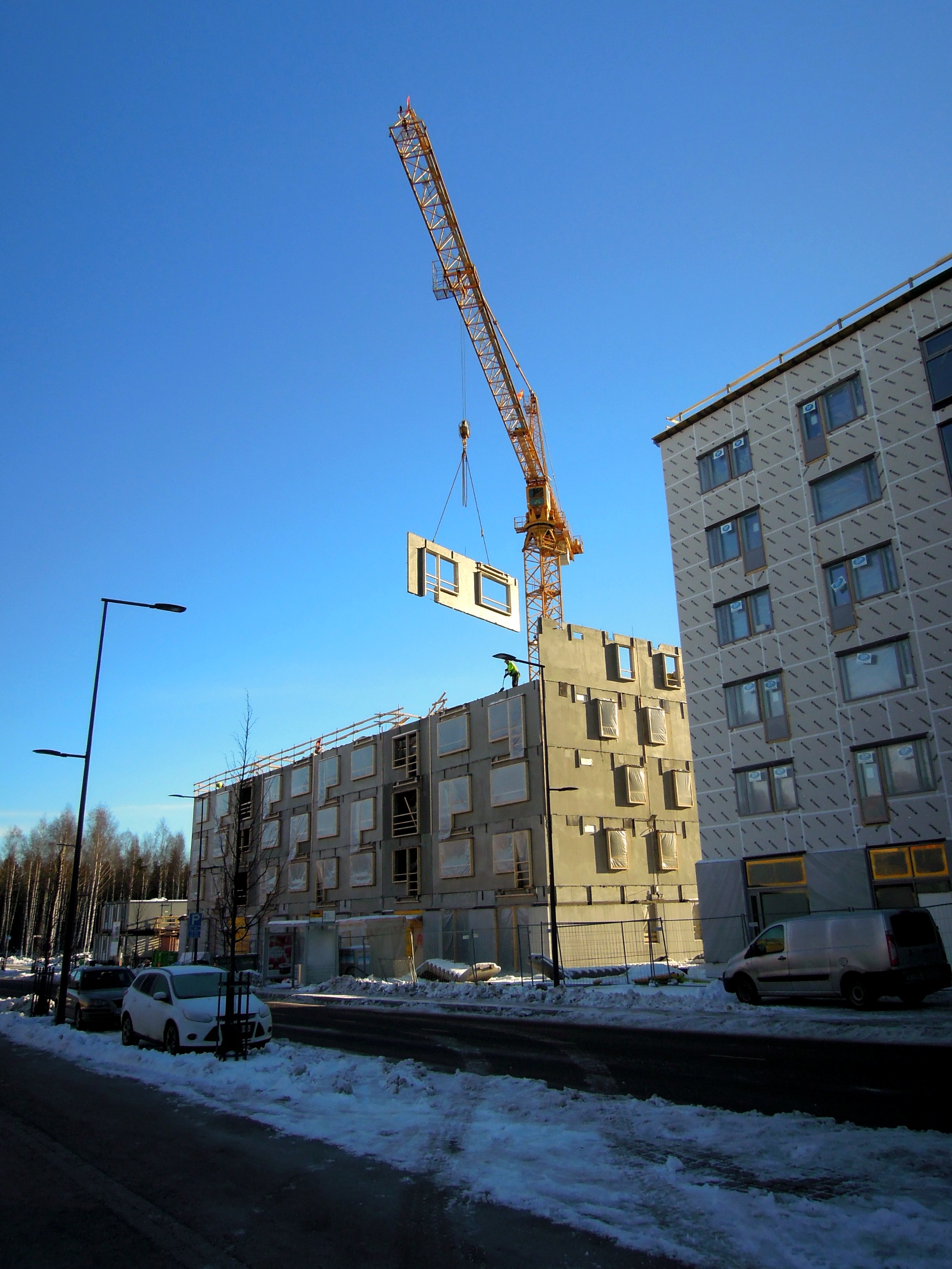 Crane at construction site in Vantaa, Finland free image download
