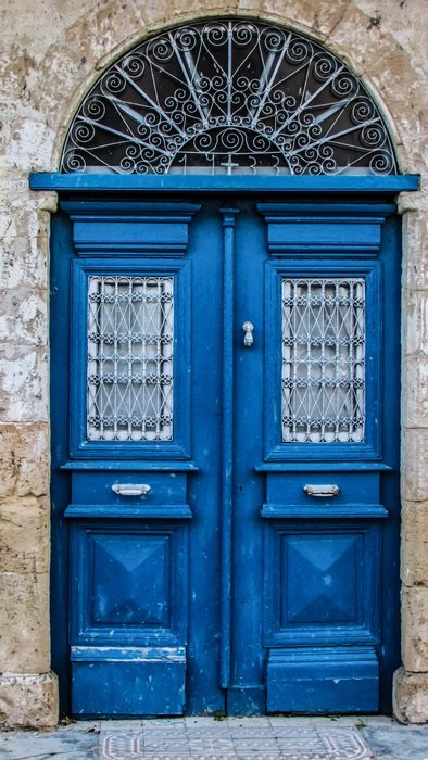 Bright blue door in cyprus free image download