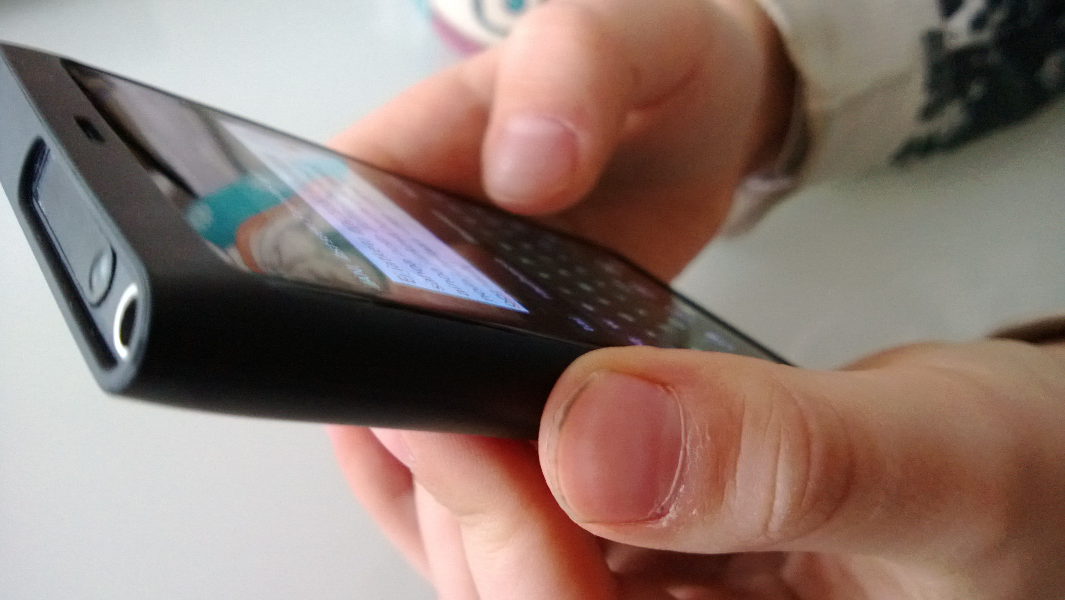 Mobile phone in hands close-up free image download