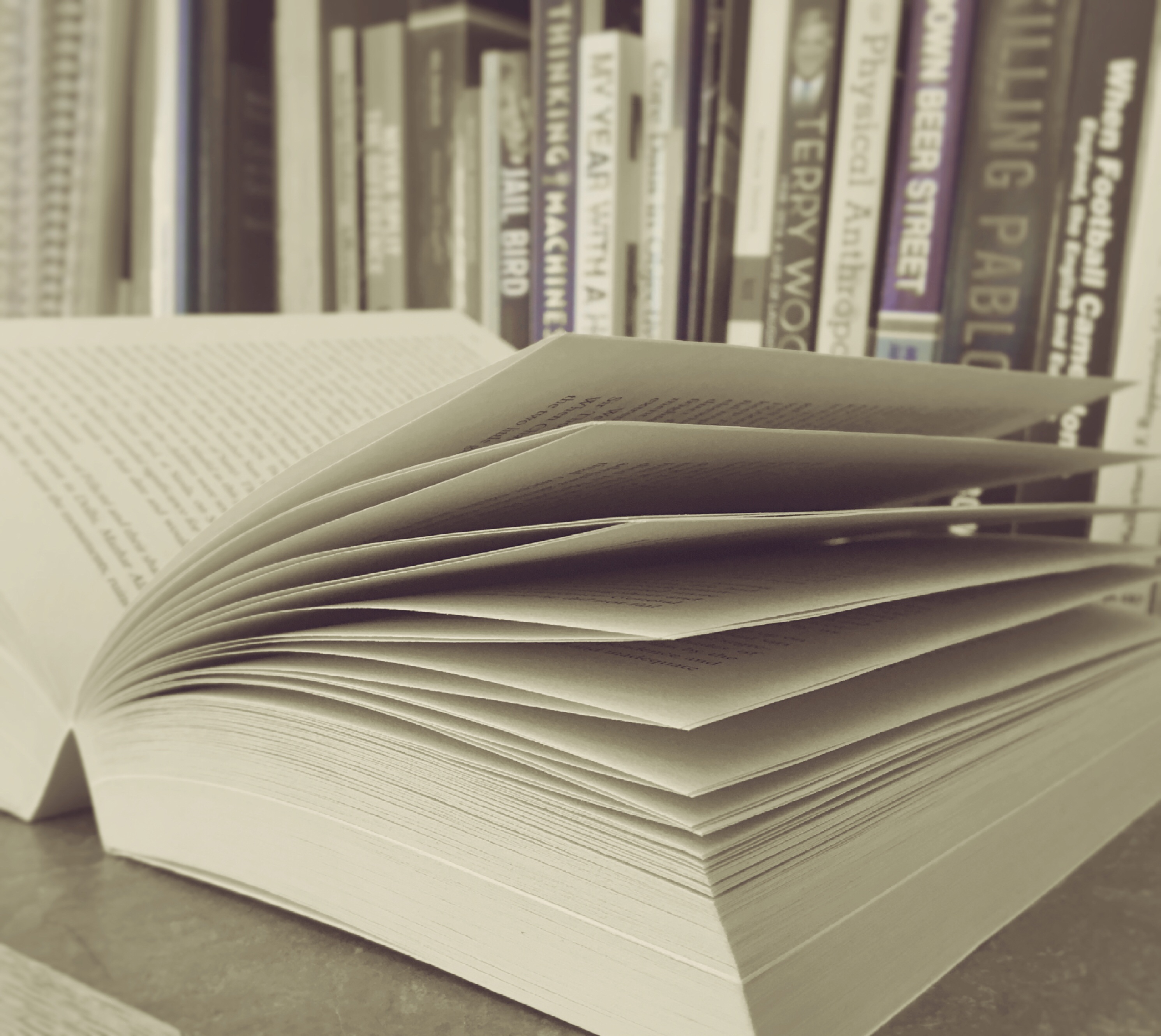 Open Book on shelf at standing ones free image download