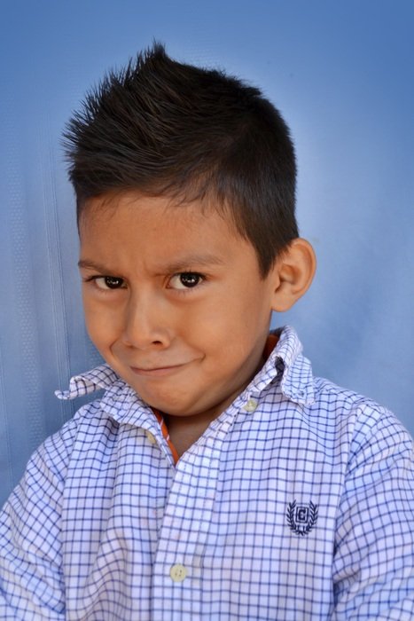 Photo of a boy in a bad mood free image download