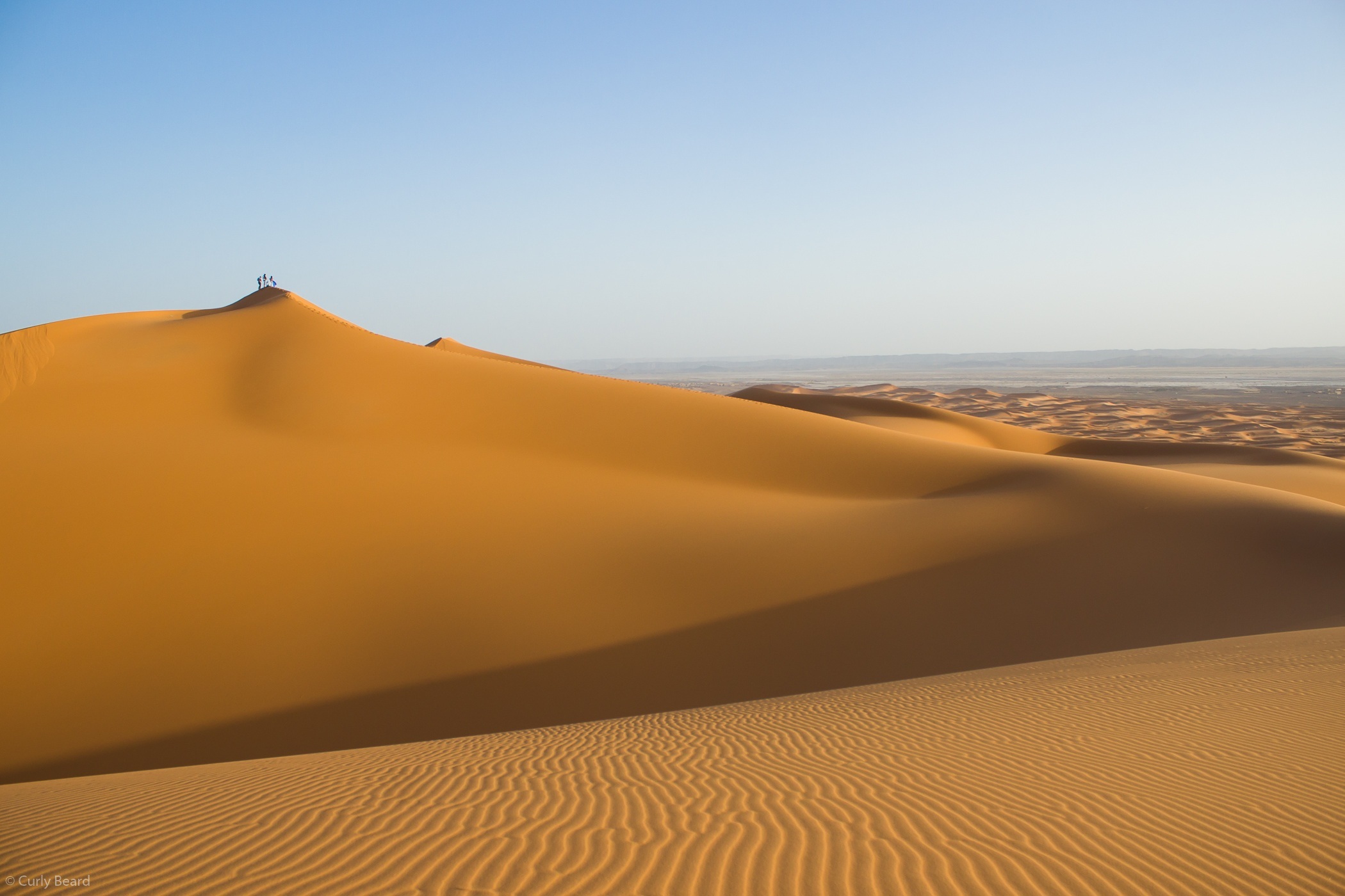 Smooth orange sand in the desert free image download