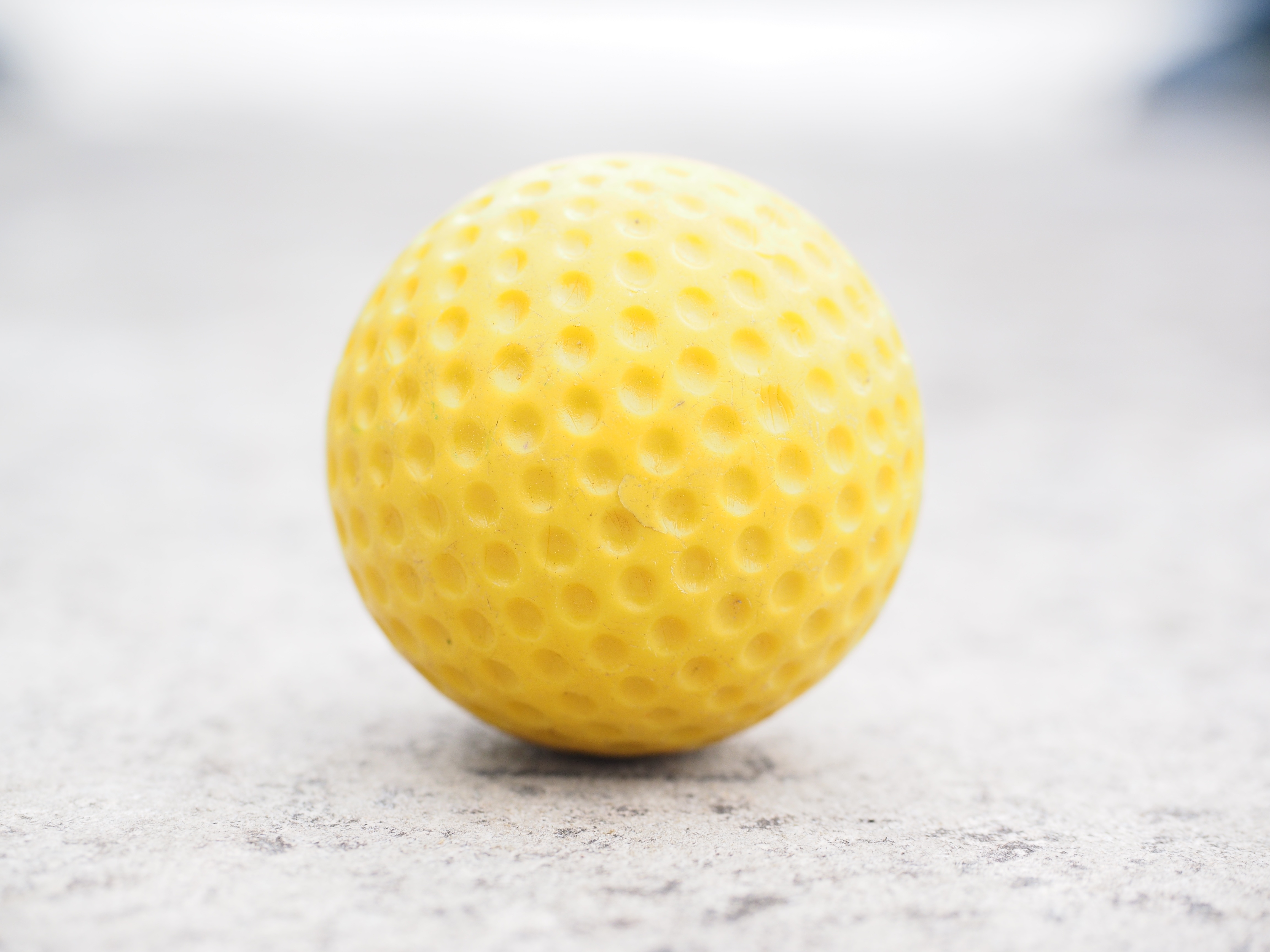 Yellow mini golf ball free image download