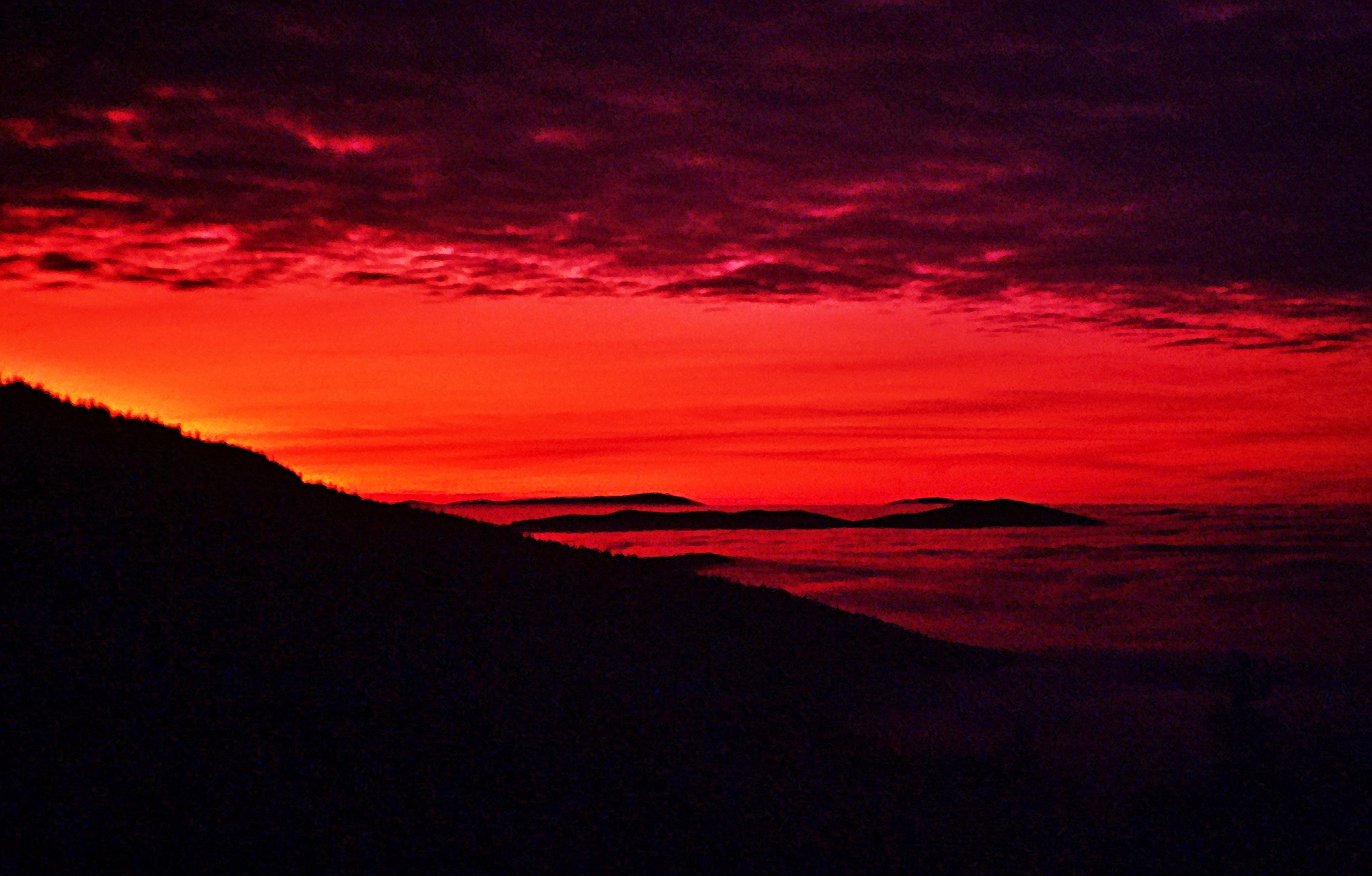 Red sky over the mountain during sunset free image download