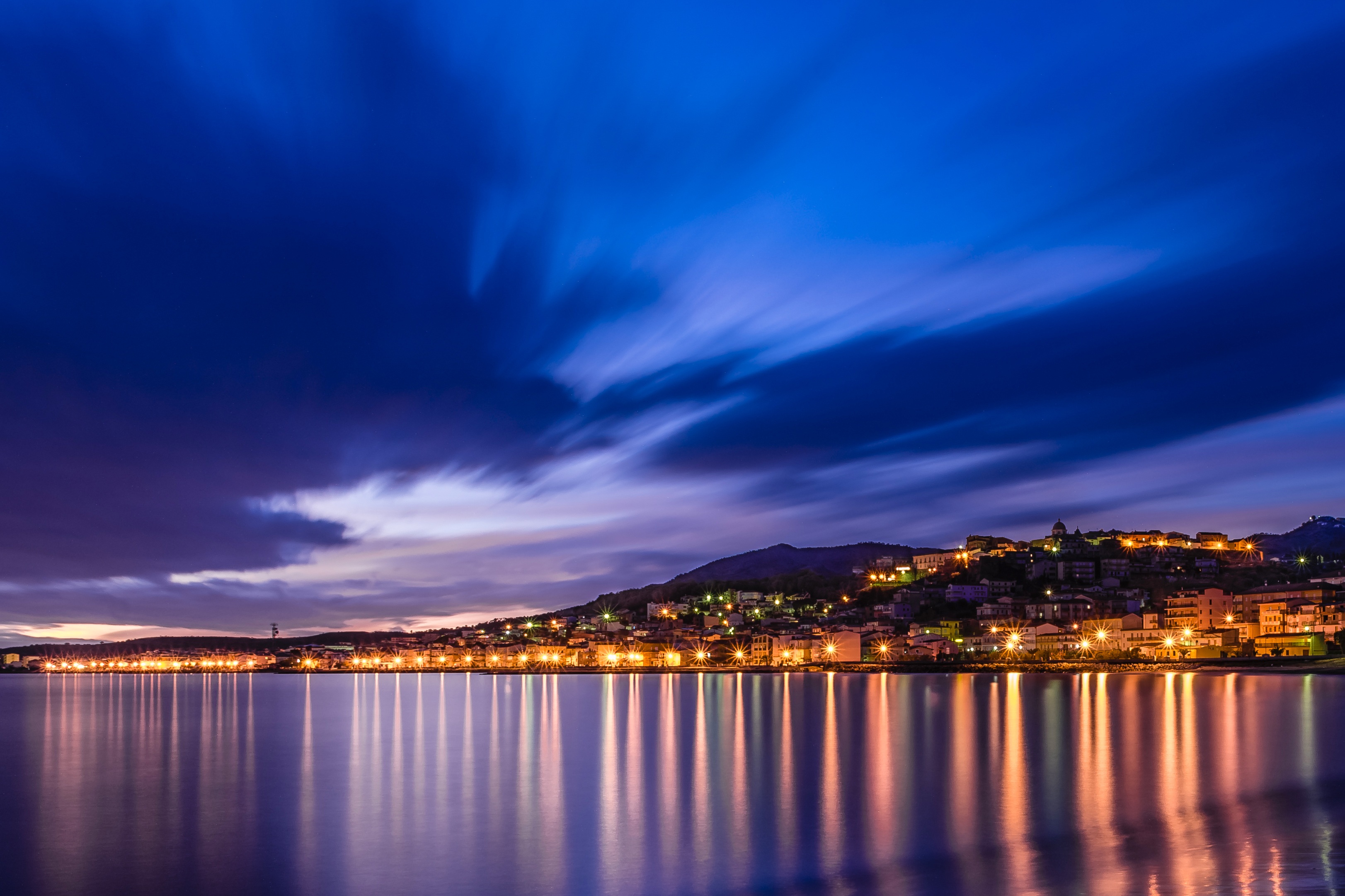 Night city lights seascape, Calabria free image download