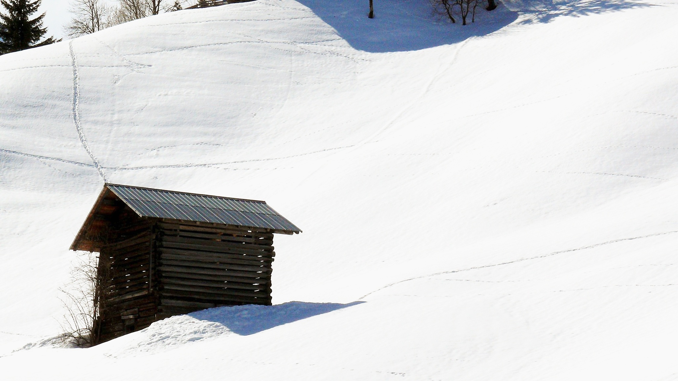 Awesome old wooden house in the snow free image download