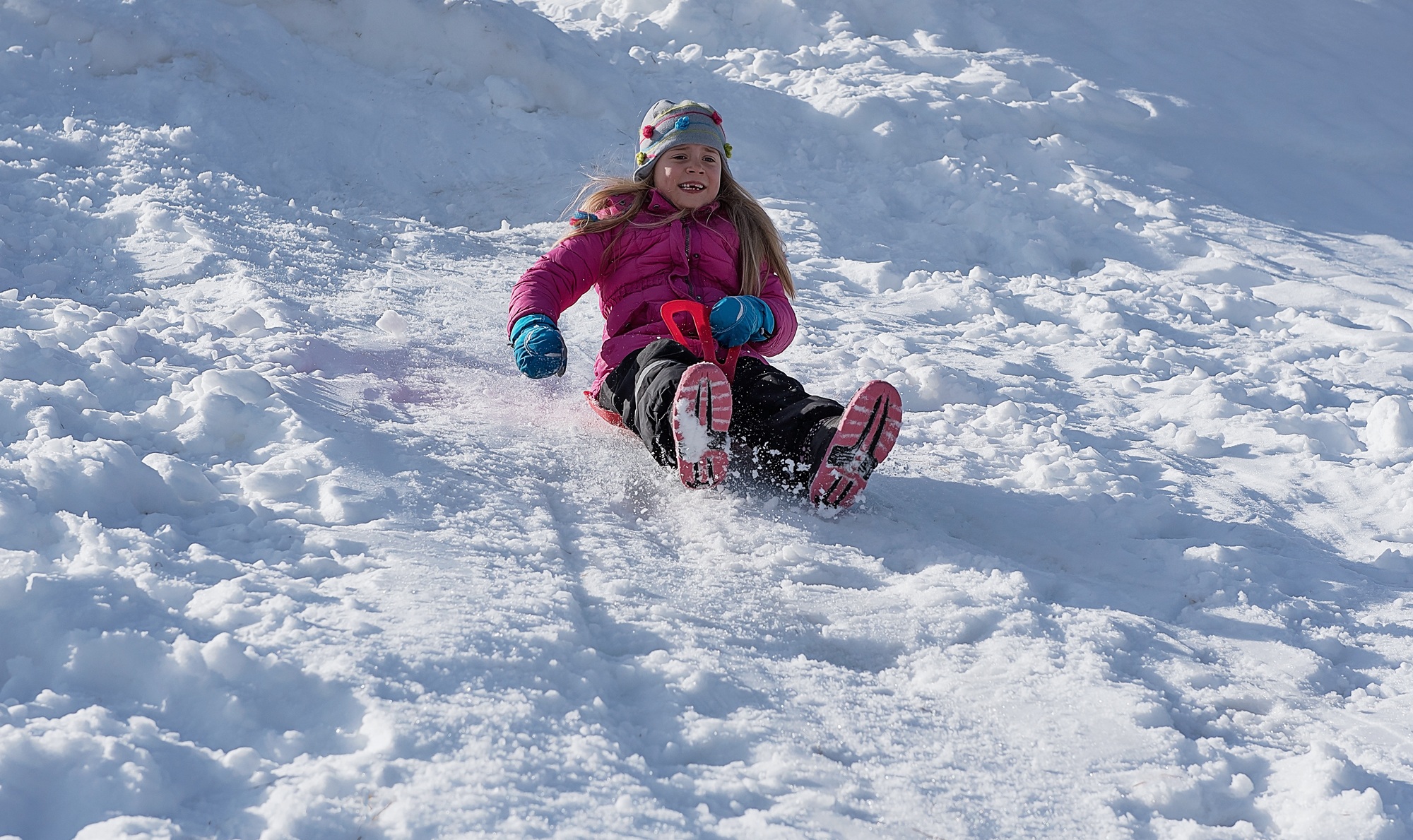 Girl is sledding from the mountain free image download