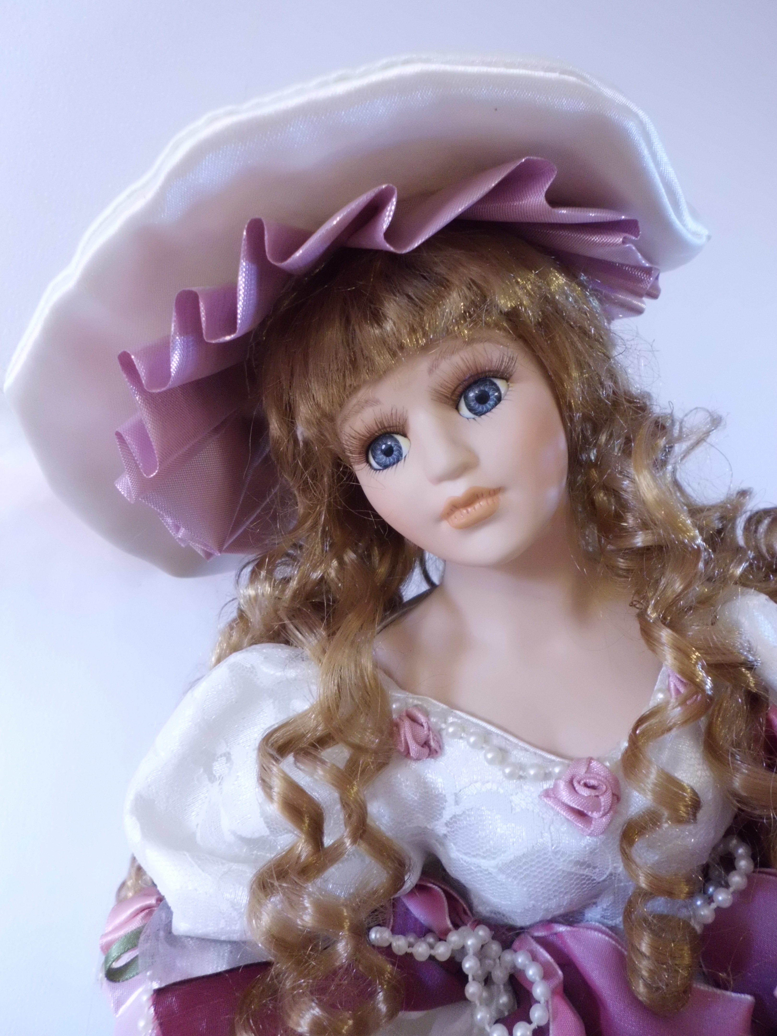 Pretty porcelain doll free image download