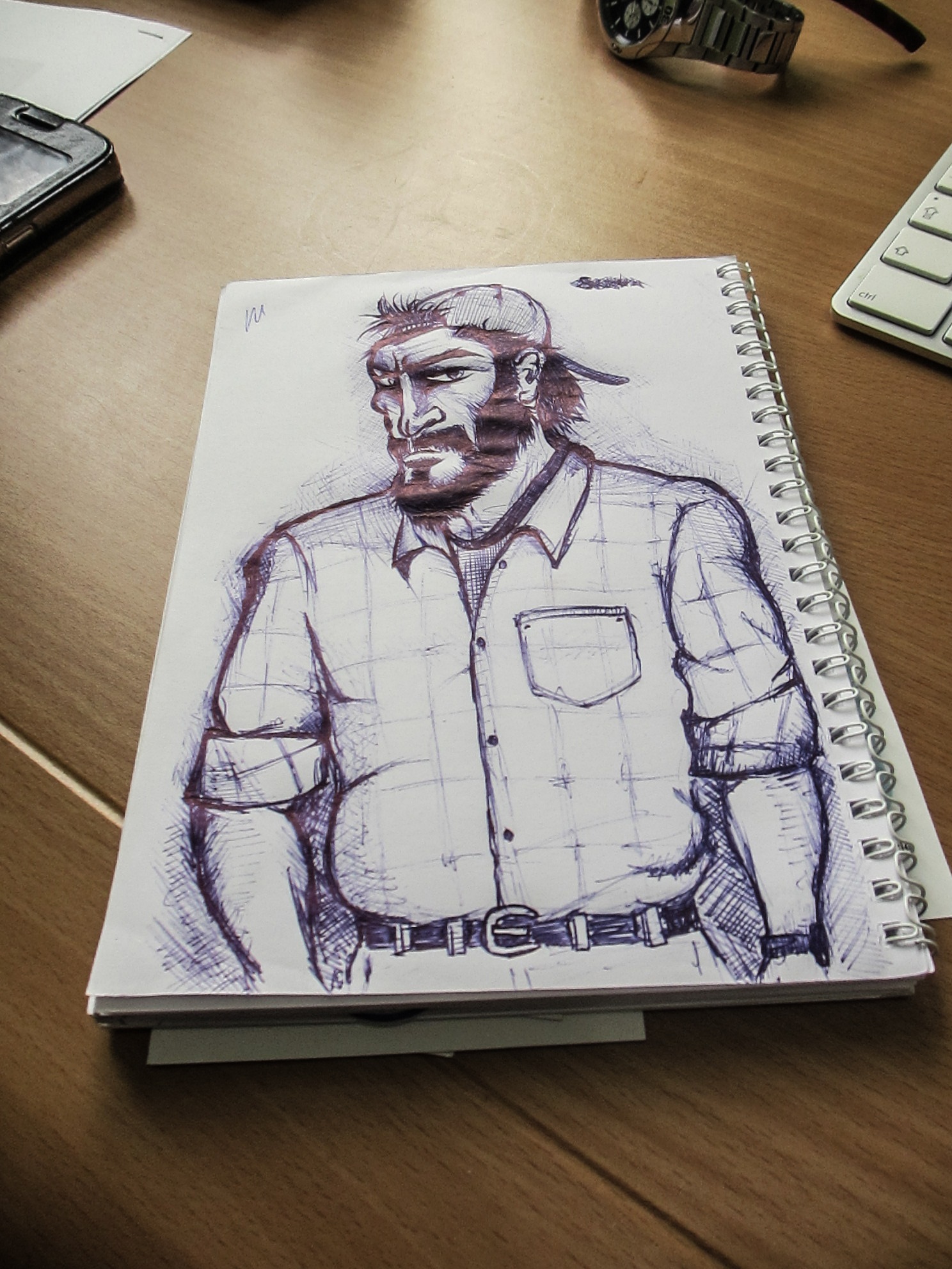 Sketch of a man in a notebook on the table free image download