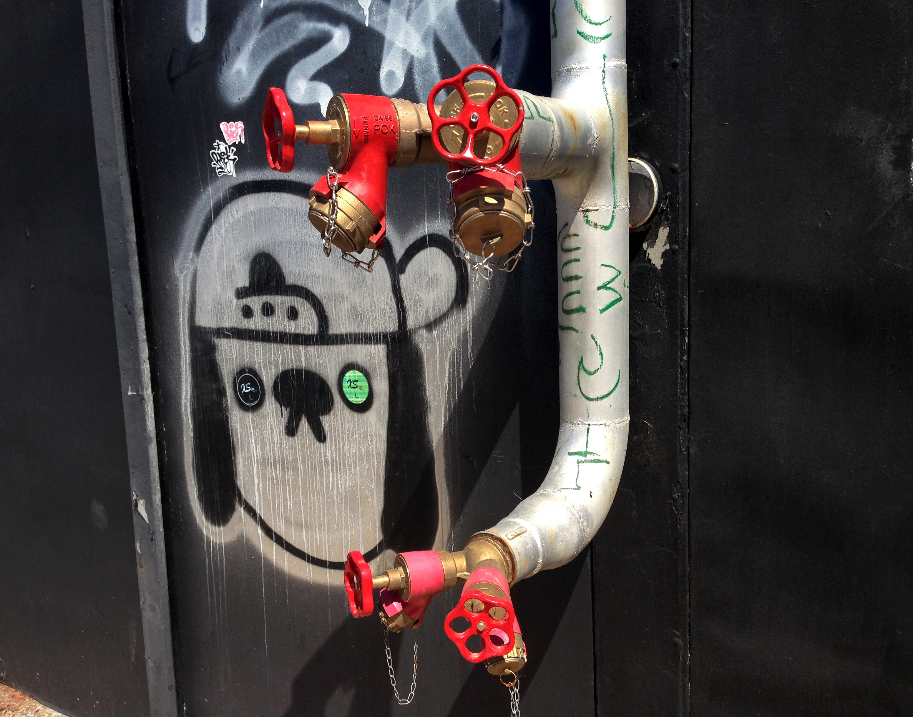 Fire hydrant on the background of graffiti on the wall free image download