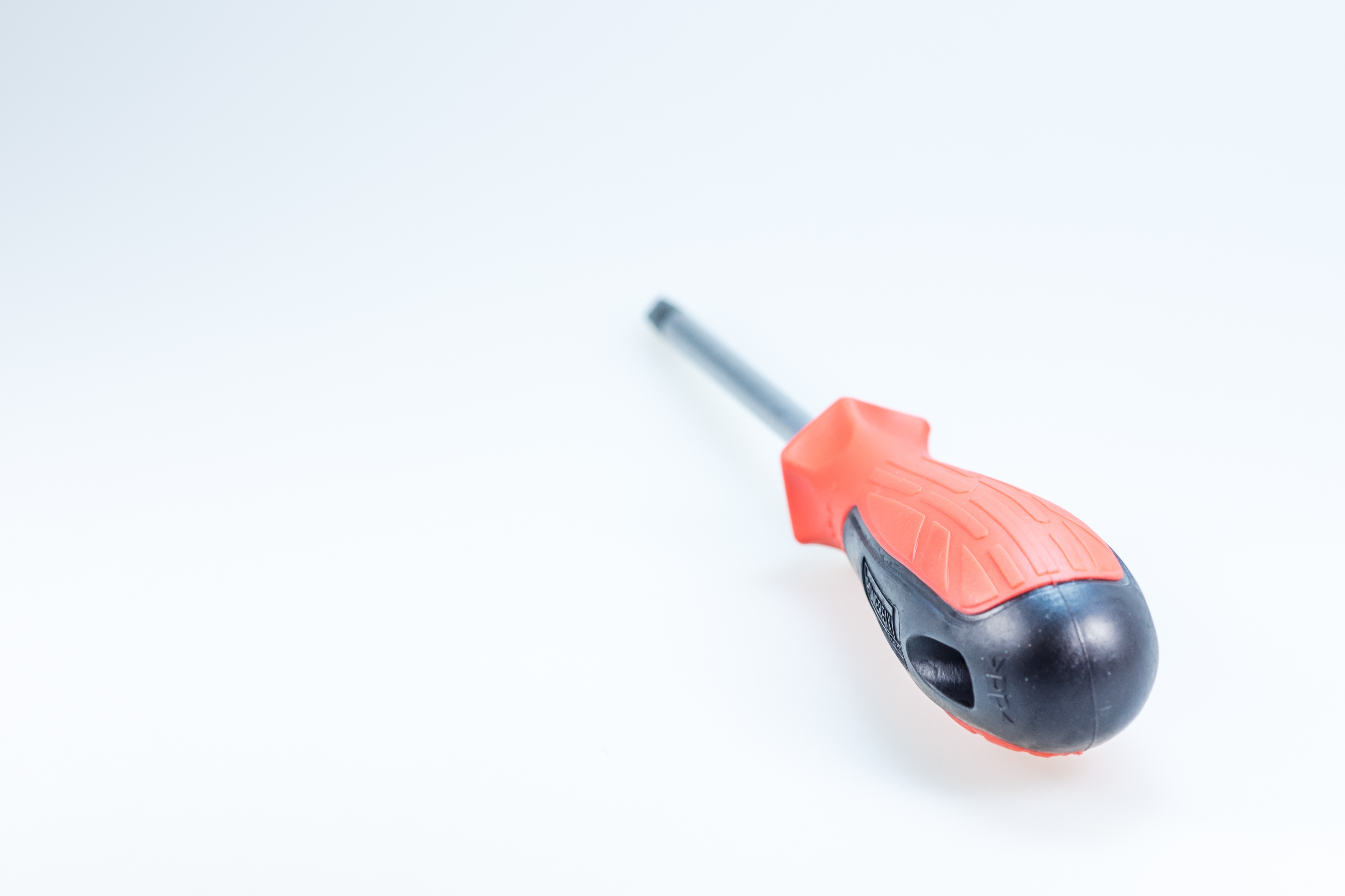 Screwdriver with a red and black handle free image download