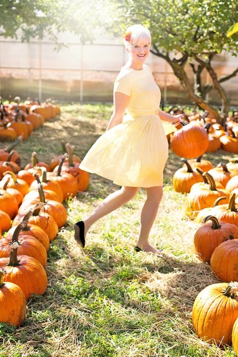 Young woman and pumpkins free image download