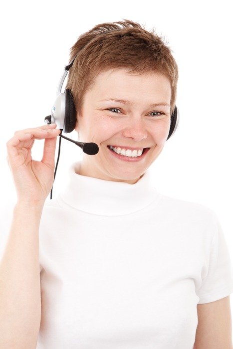 Young woman in the headset with a microphone free image download