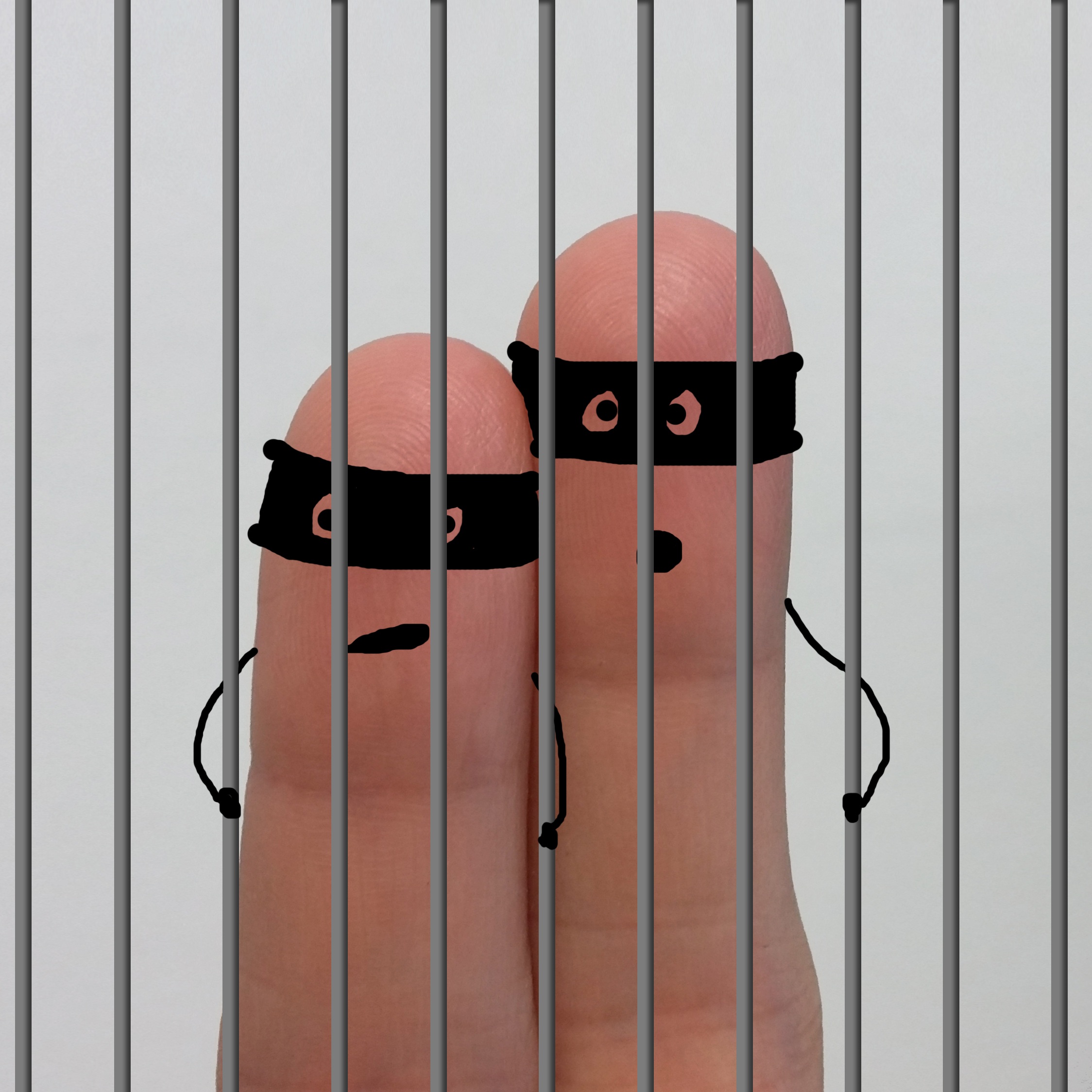 Photo of two fingers in prison free image download