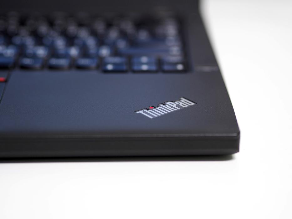 Close-up of the black "Lenovo ThinkPad" laptop with sign free image ...